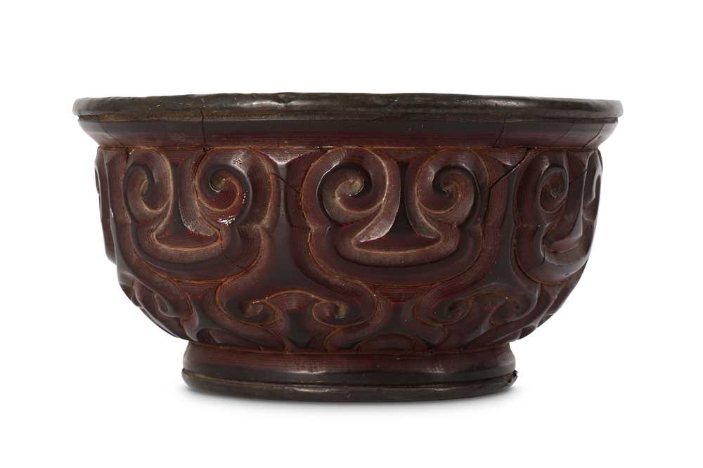 Lot 865 - A CHINESE TIXI LACQUER CUP. Ming Dynasty.