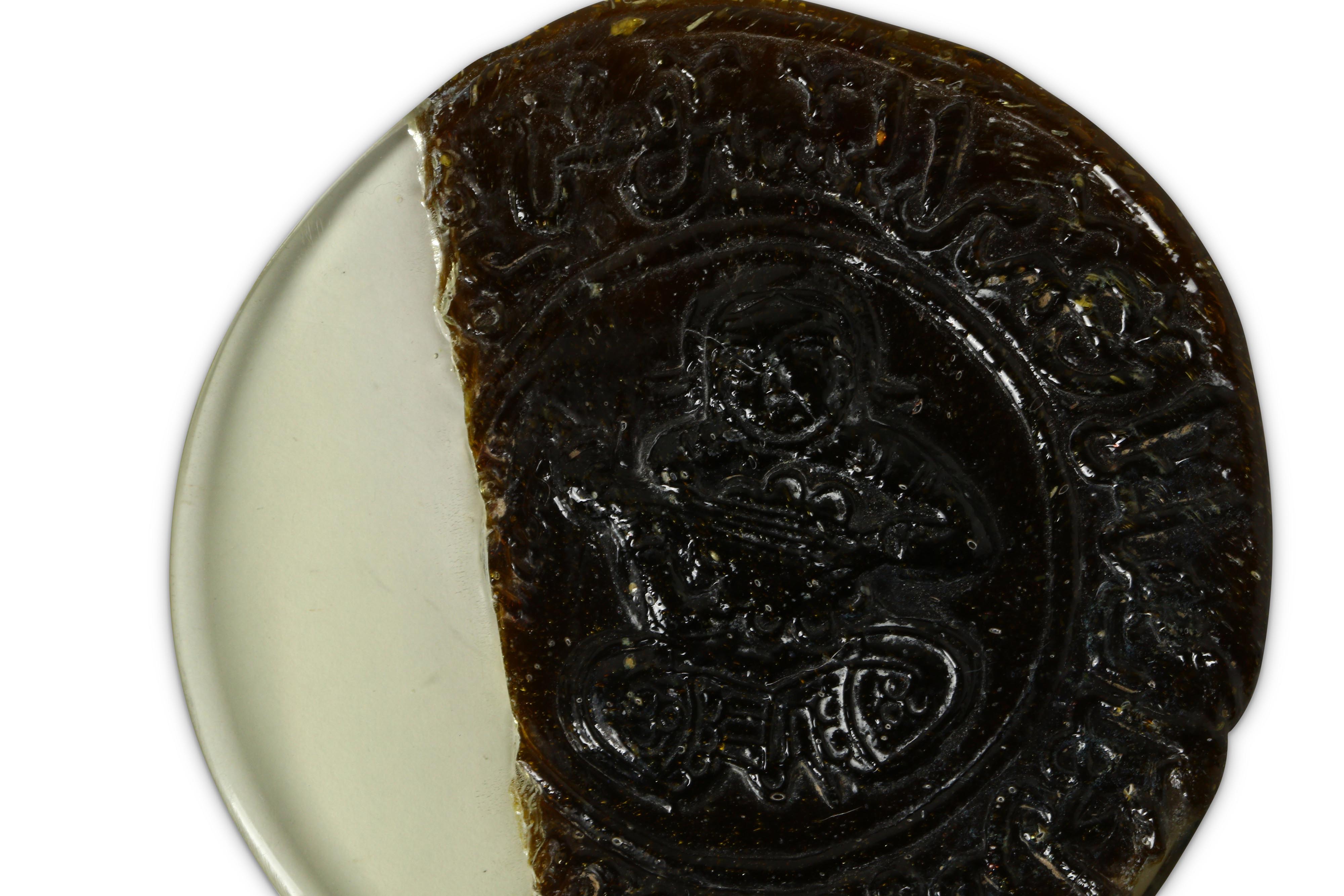 Lot 126 - TWO FRAGMENTS OF HOT-WORKED GLASS MEDALLIONS