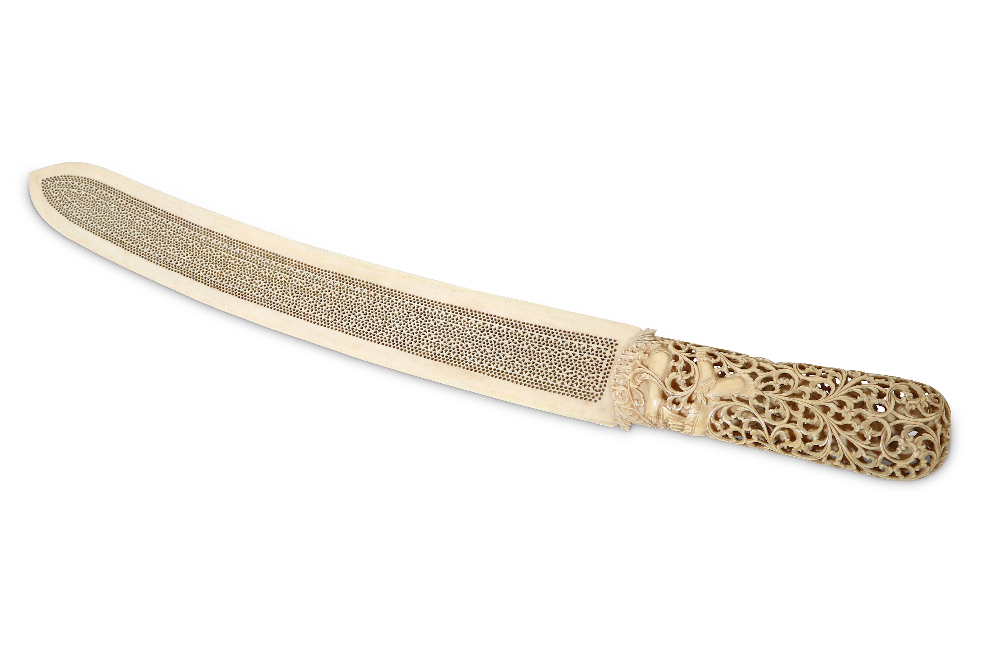 Lot 145 - A BURMESE RETICULATED IVORY PAPER KNIFE.