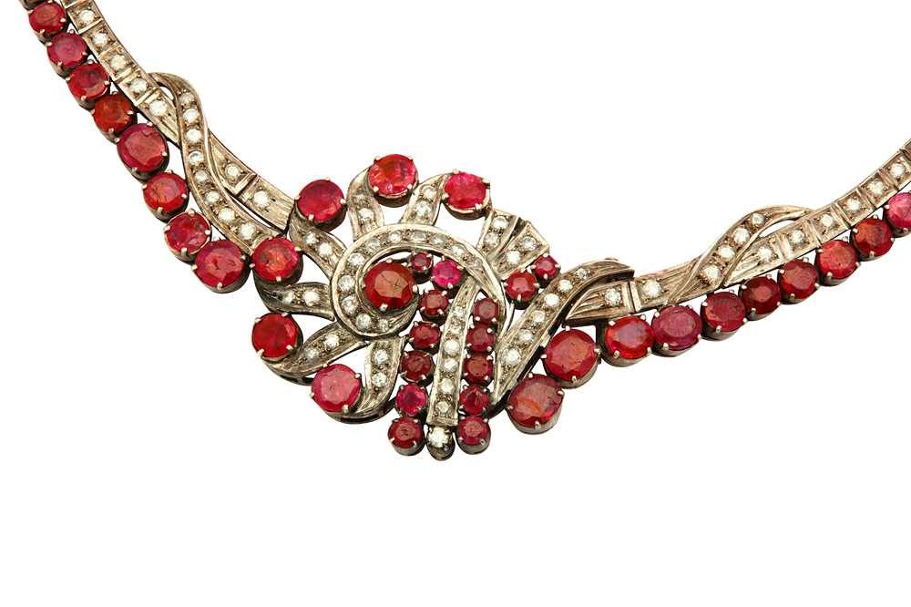 Lot 510 - A gem-set necklace Of scrolling geometric
