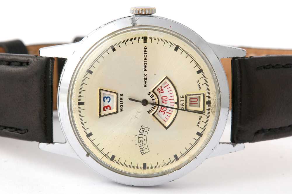 Lot 639 - PRESTIGE. A STEEL MANUAL WRISTWATCH Movement: