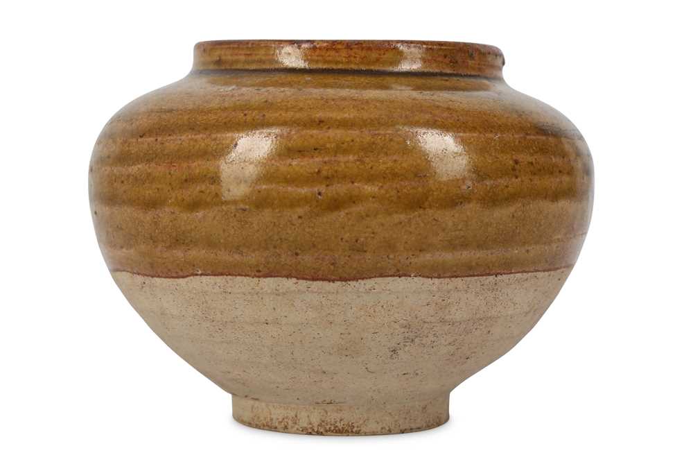 Lot 689 - A SMALL CHINESE OLIVE-GLAZED JAR. Tang