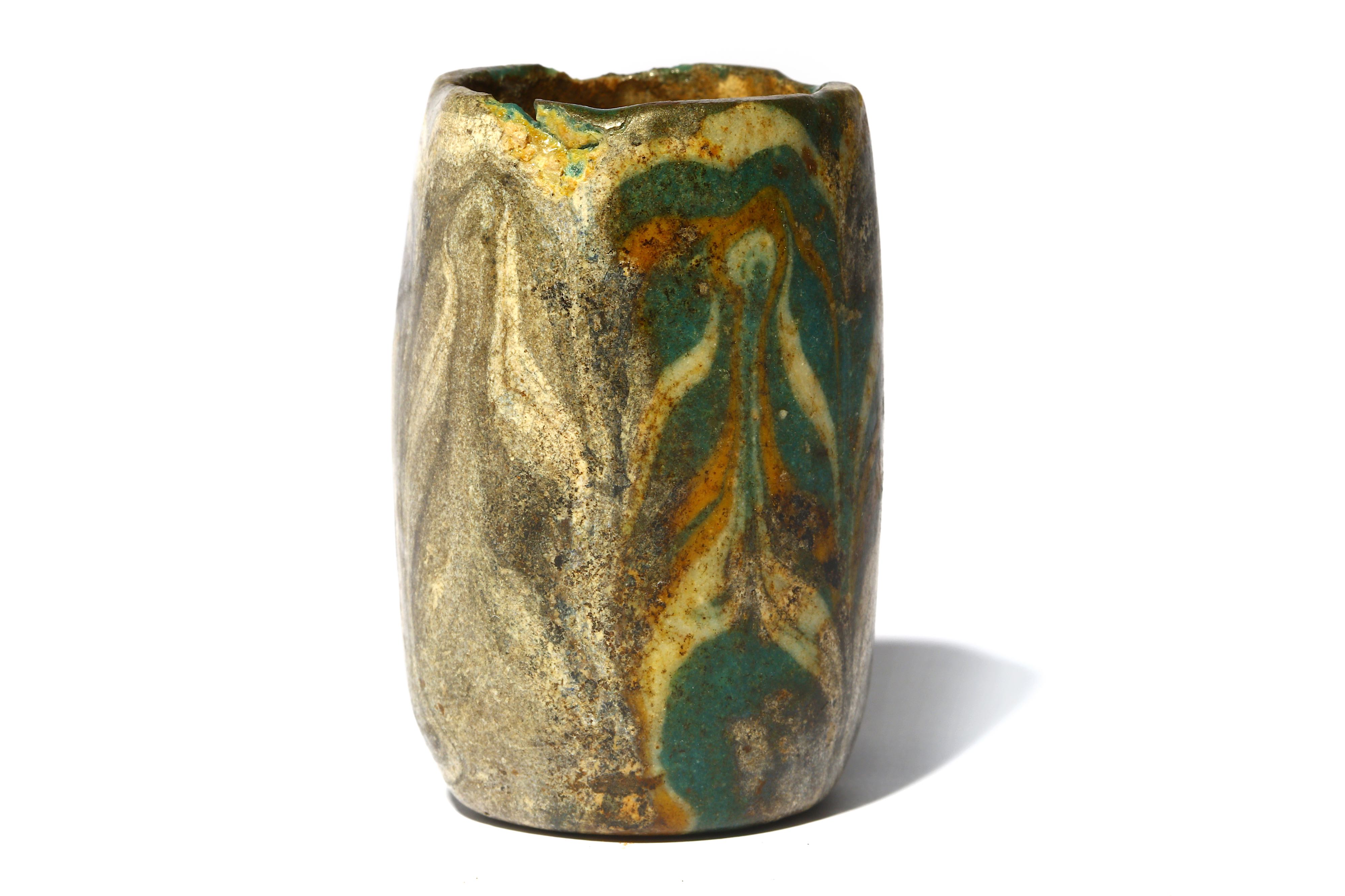 Lot 168 - AN EGYPTIAN FRAGMENTARY CORE-FORMED GLASS