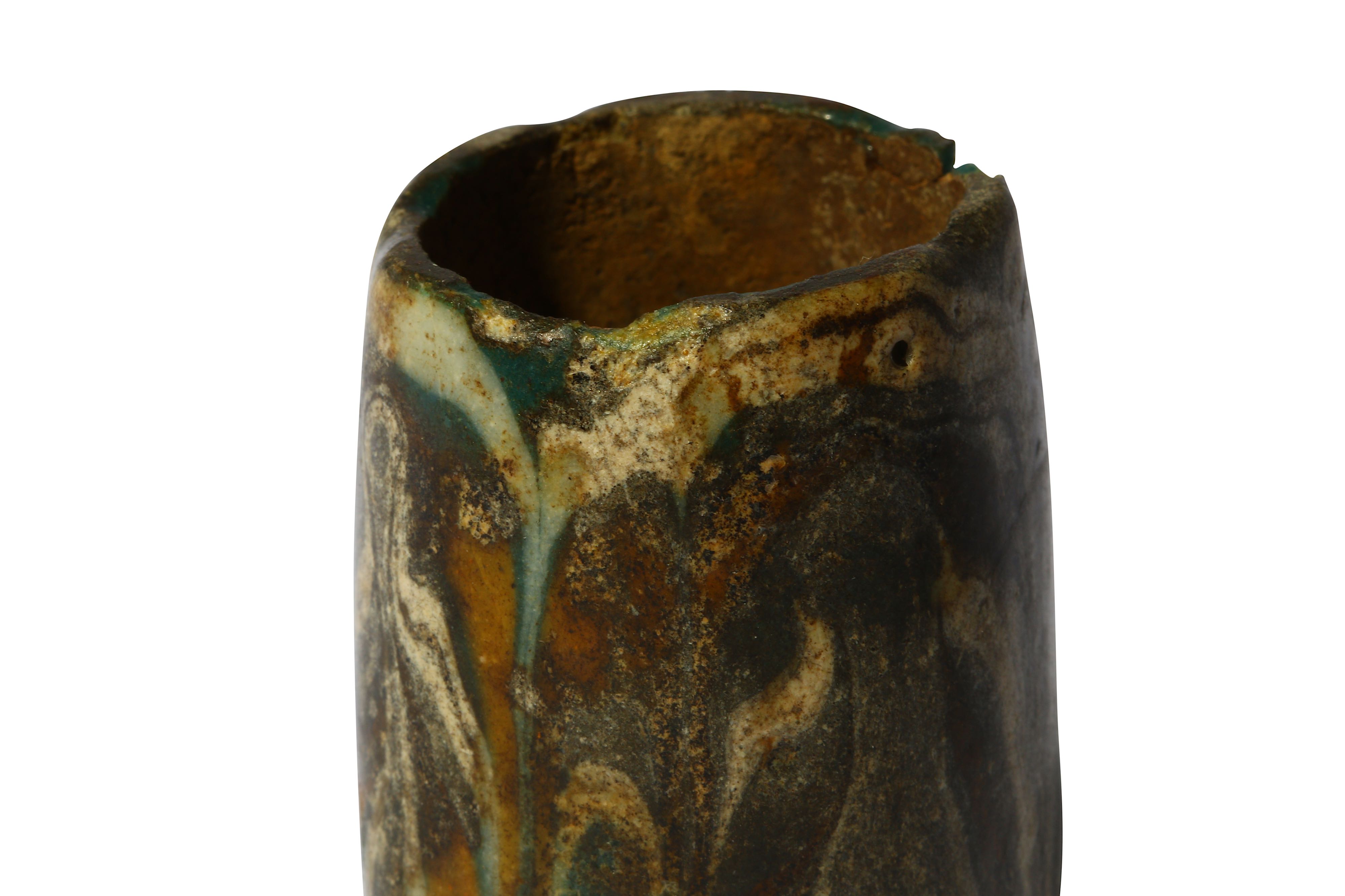 Lot 168 - AN EGYPTIAN FRAGMENTARY CORE-FORMED GLASS