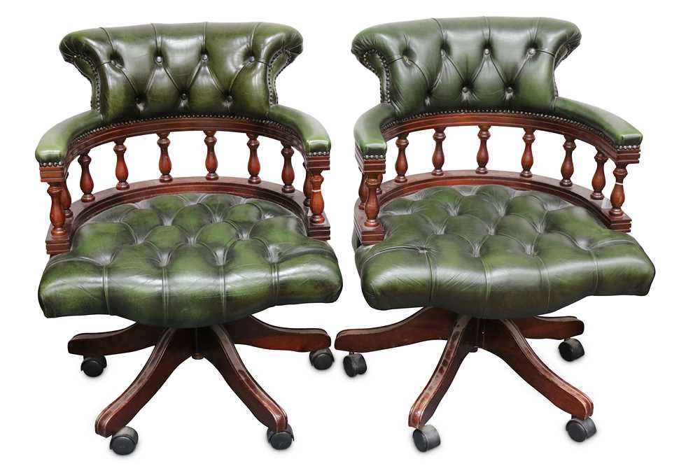 Lot 357 - A pair of Captains chairs, upholstered in