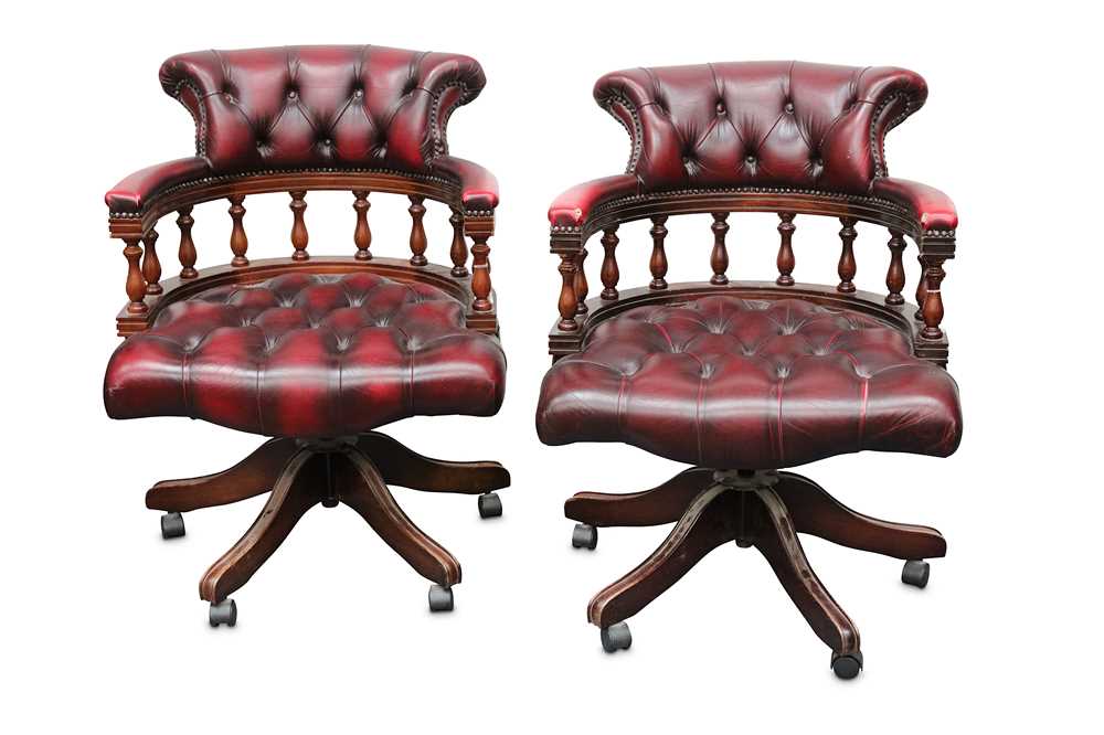 Lot 358 - A pair of Captains chairs, upholstered in