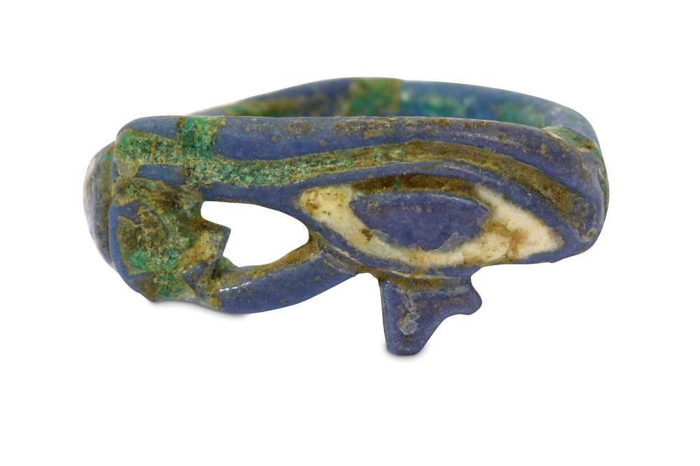 Lot 174 - AN EGYPTIAN GLAZED COMPOSITION UDJAT EYE