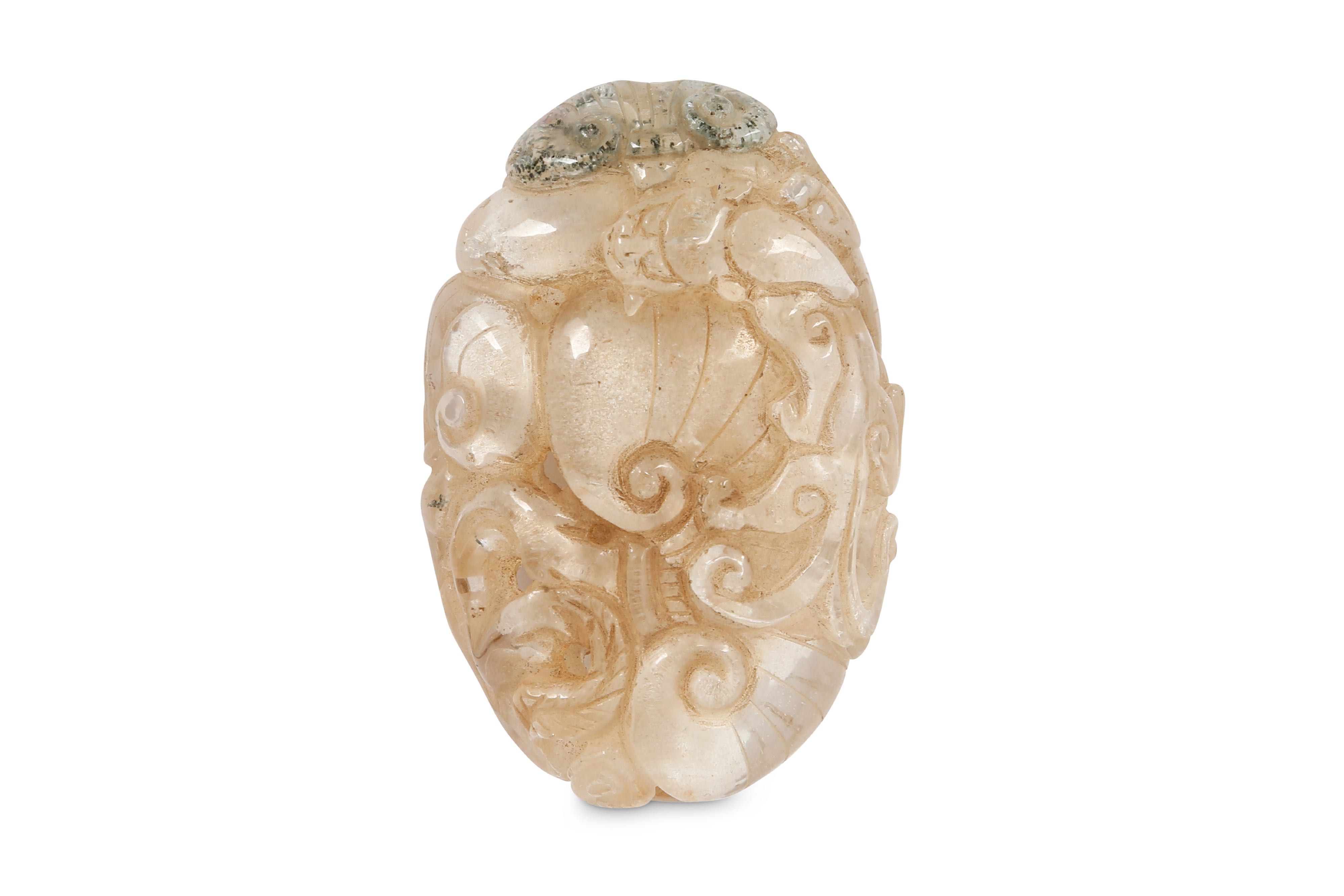 Lot 188 - A CHINESE CRYSTAL 'DRAGON' CARVING. The oval