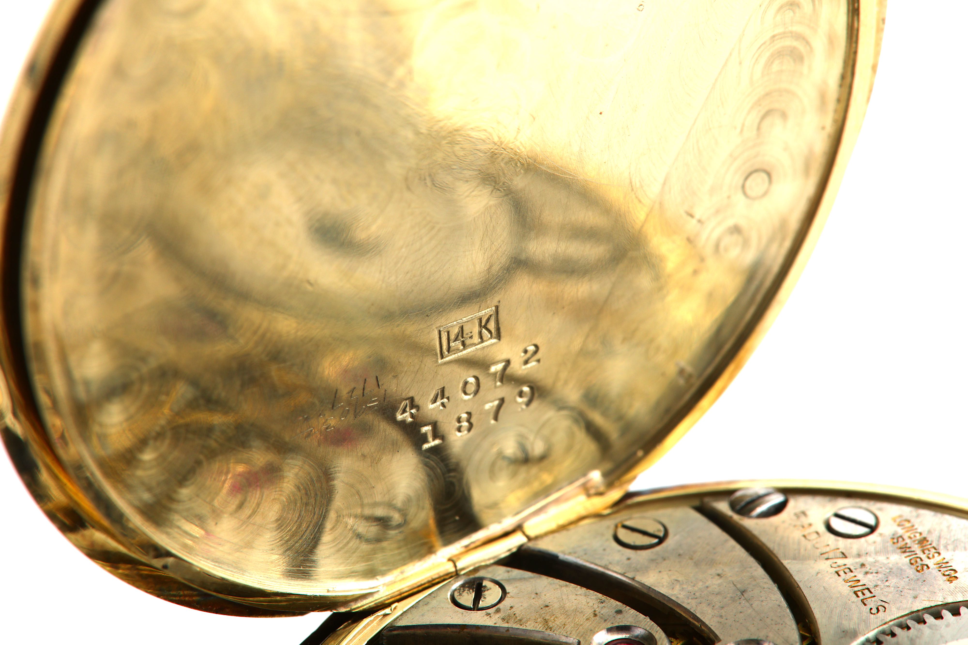 Lot 304 - LONGINES. A 14K YELLOW GOLD OPEN FACE POCKET