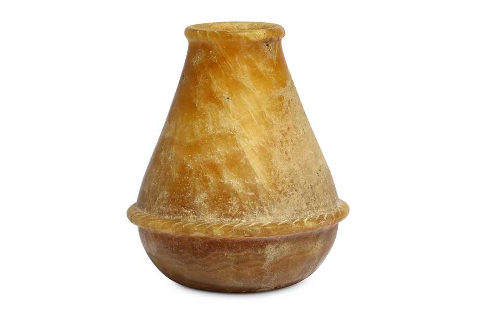 Lot 167 - AN EGYPTIAN ALABASTER VESSEL New Kingdom,