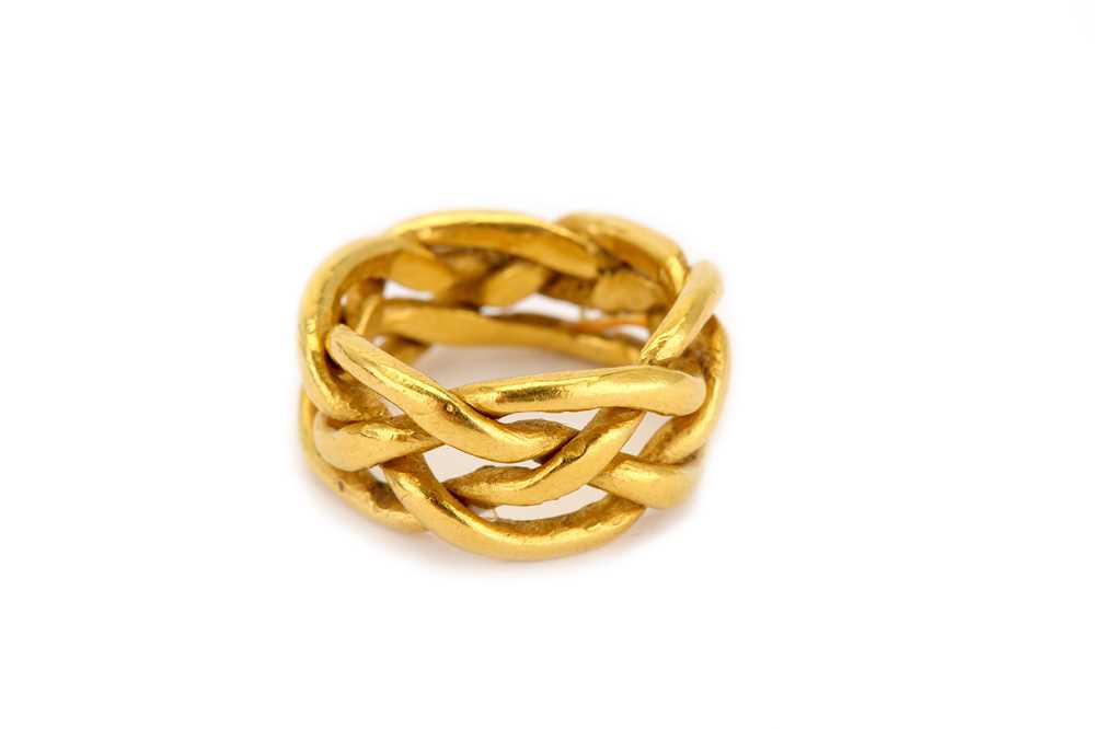 Lot 326 - A band ring, of openwork interwoven design,