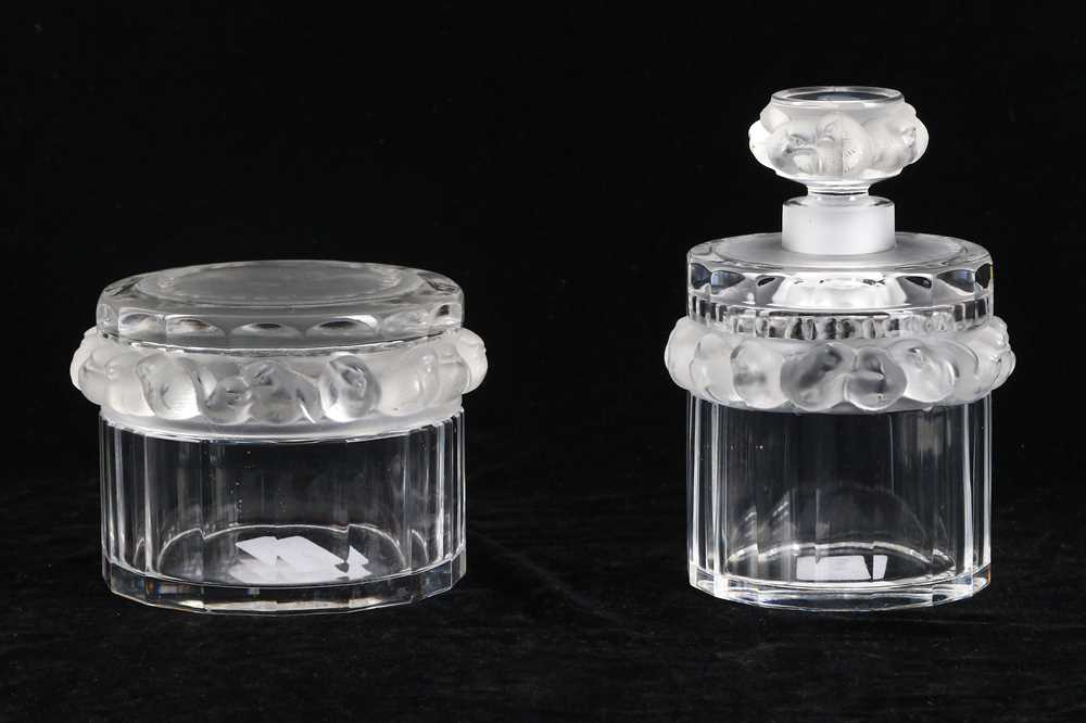 Lot 480 - A Lalique glass Robinson pattern powder jar