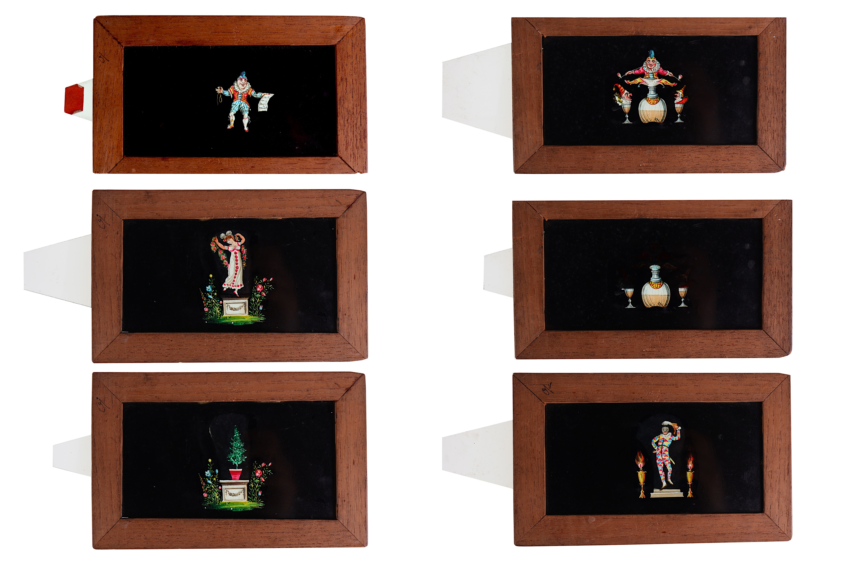 Lot 334 - A GROUP OF FOUR HAND PAINTED MAHOGANY MAGIC