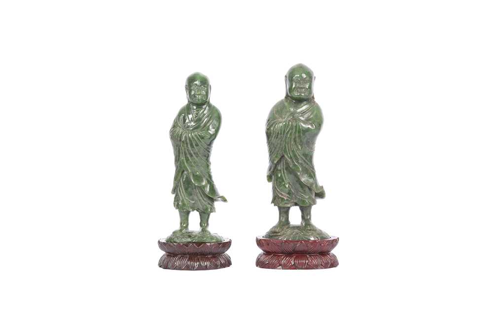 Lot 255 - TWO CHINESE SPINACH-GREEN JADE FIGURES OF