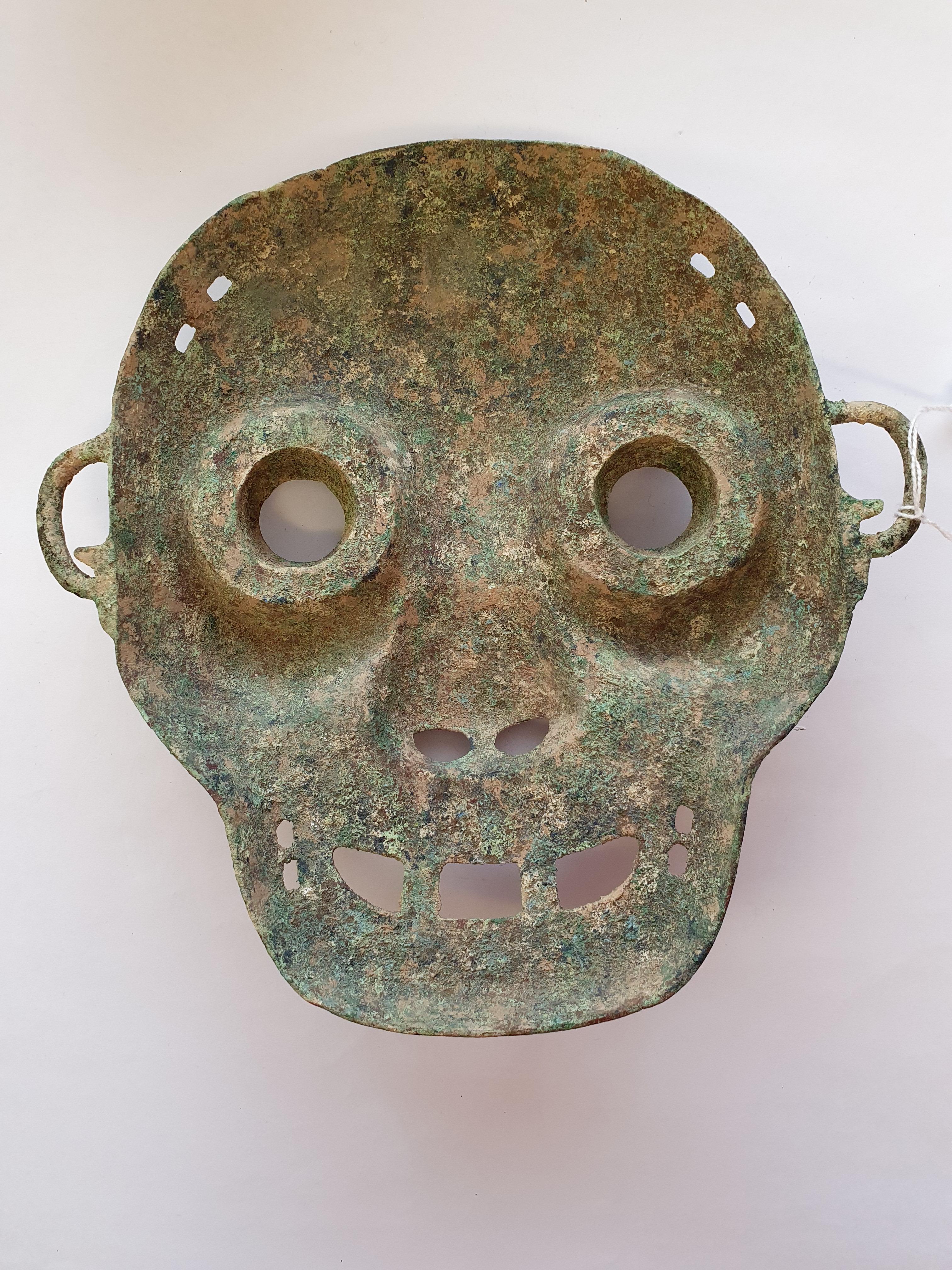 Lot 339 - A CHINESE BRONZE MASK.