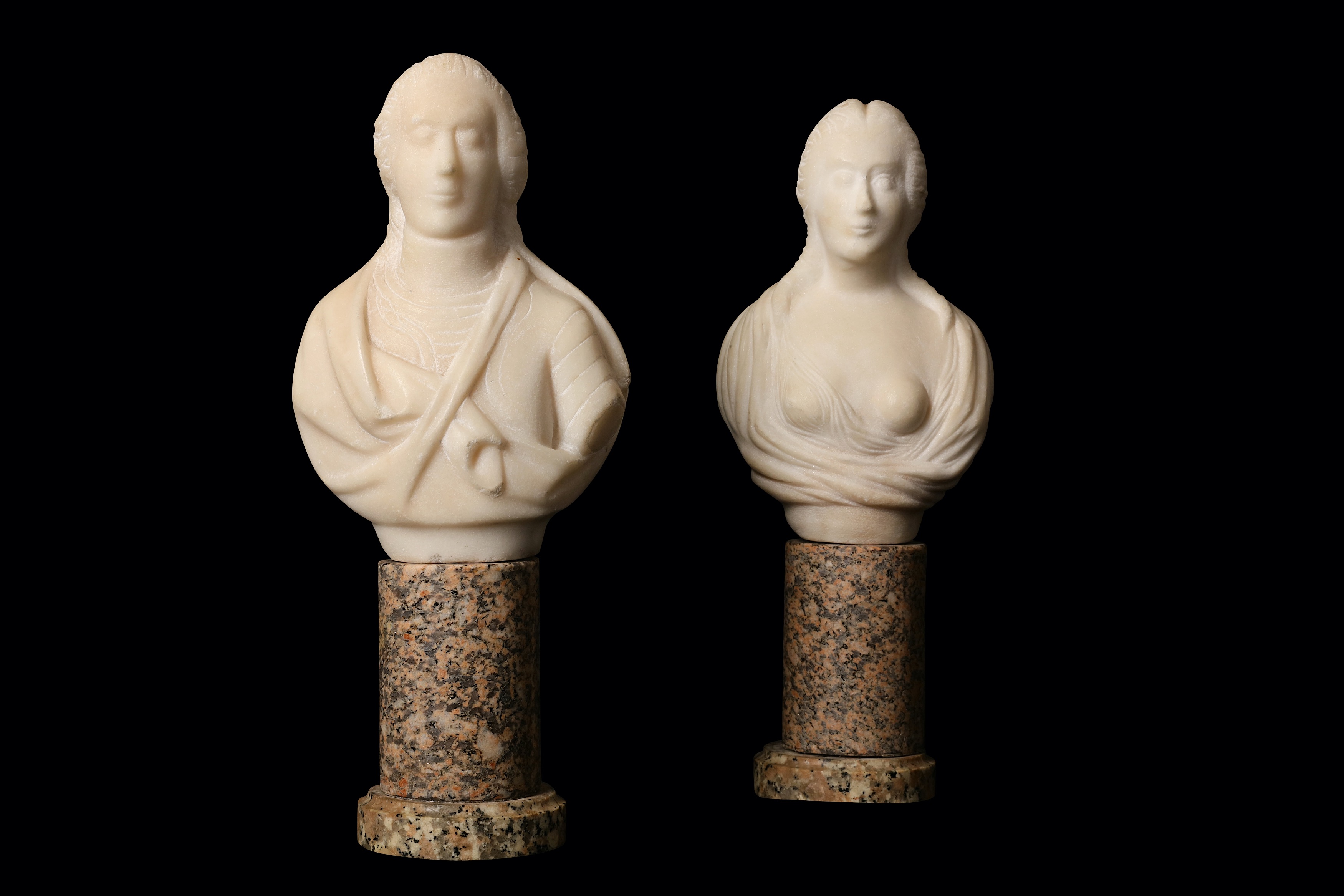 Lot 194 - A pair of small white marble busts of a lady