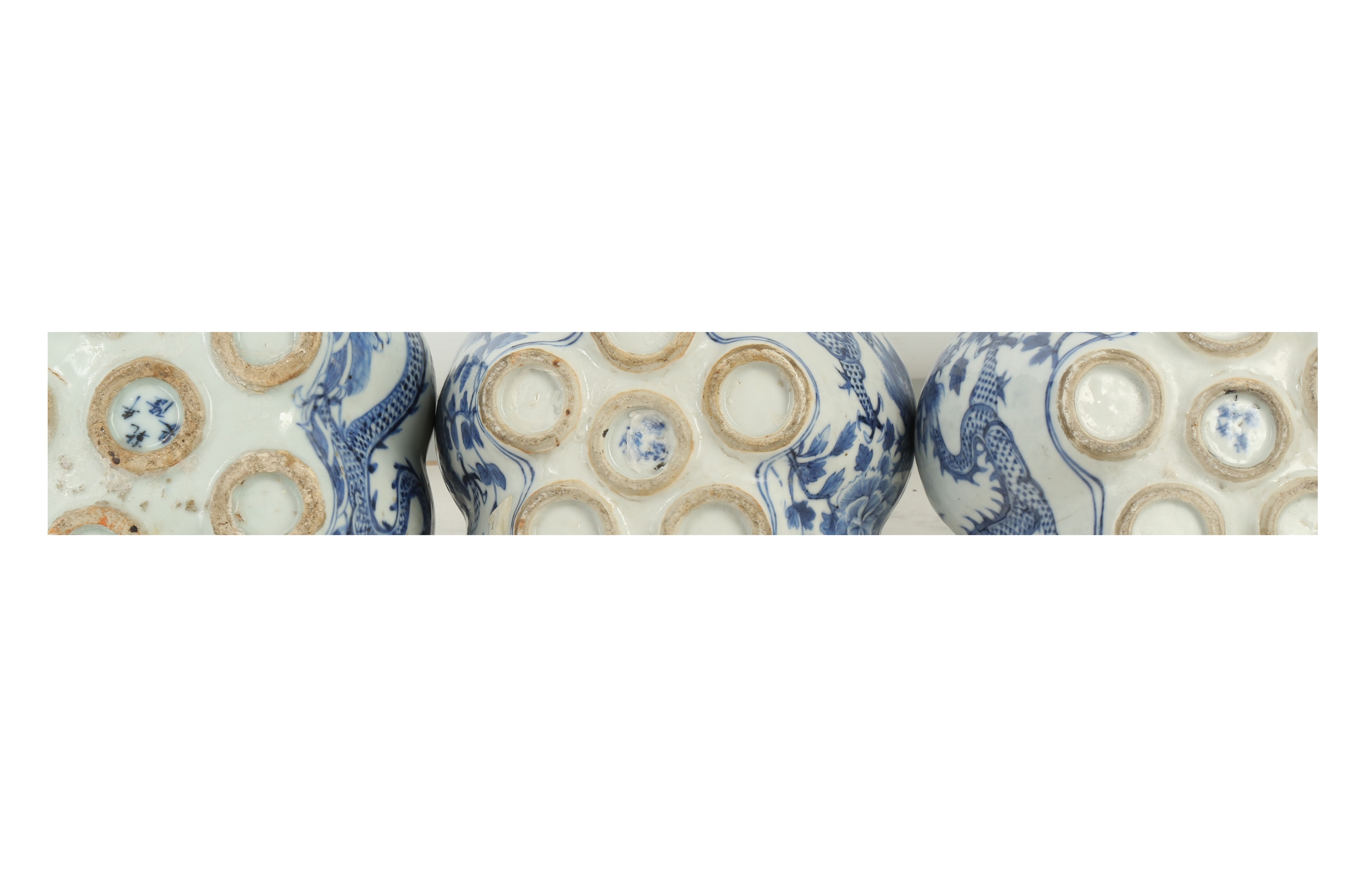 Lot 574 - THREE CHINESE BLUE AND WHITE 'DRAGON' TULIP