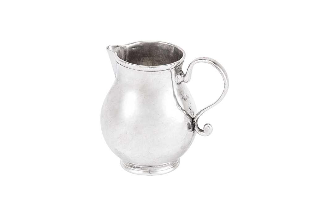 Lot 512 - A George I silver ‘sparrow beak’ cream jug,