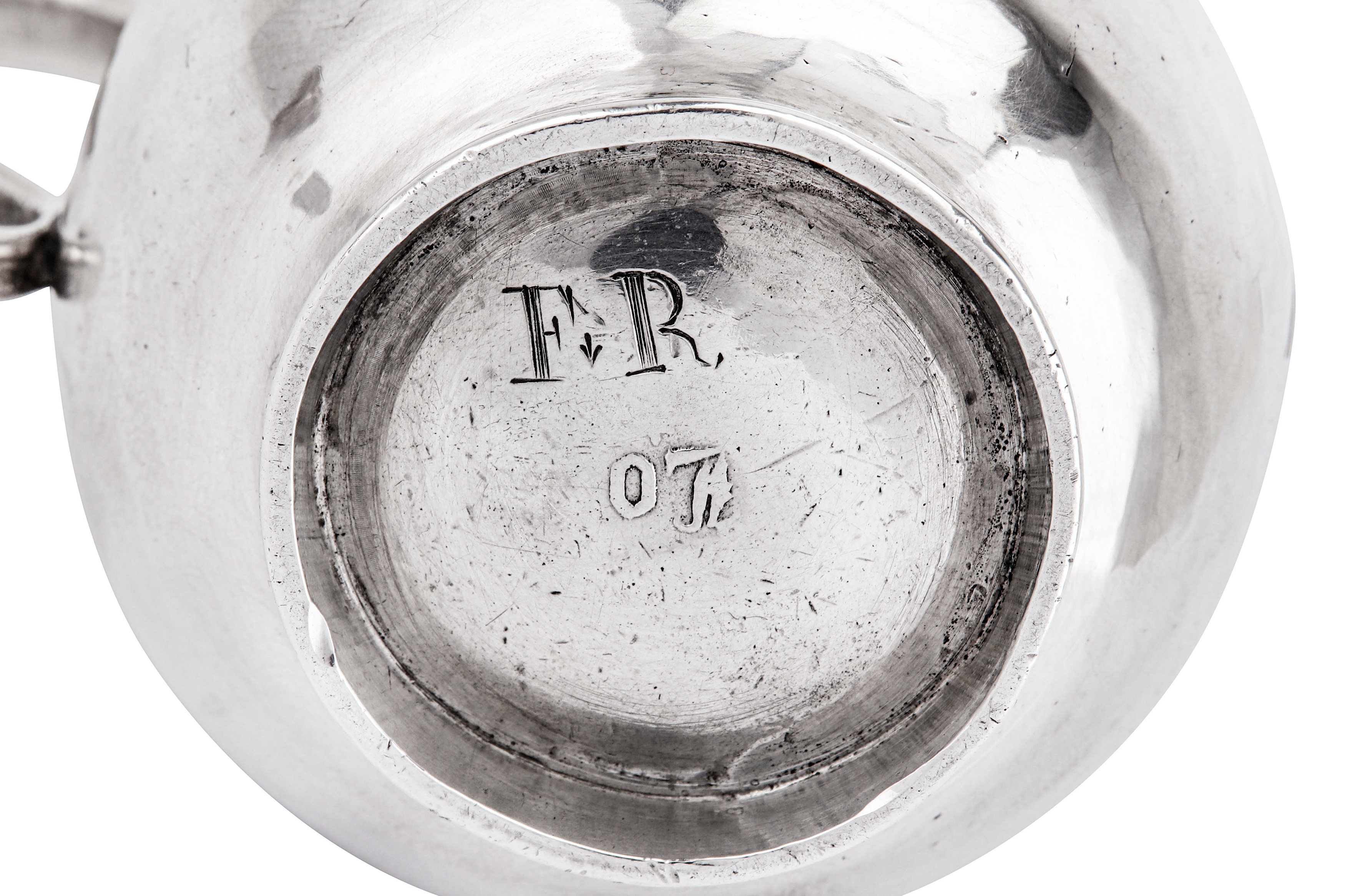 Lot 512 - A George I silver ‘sparrow beak’ cream jug,