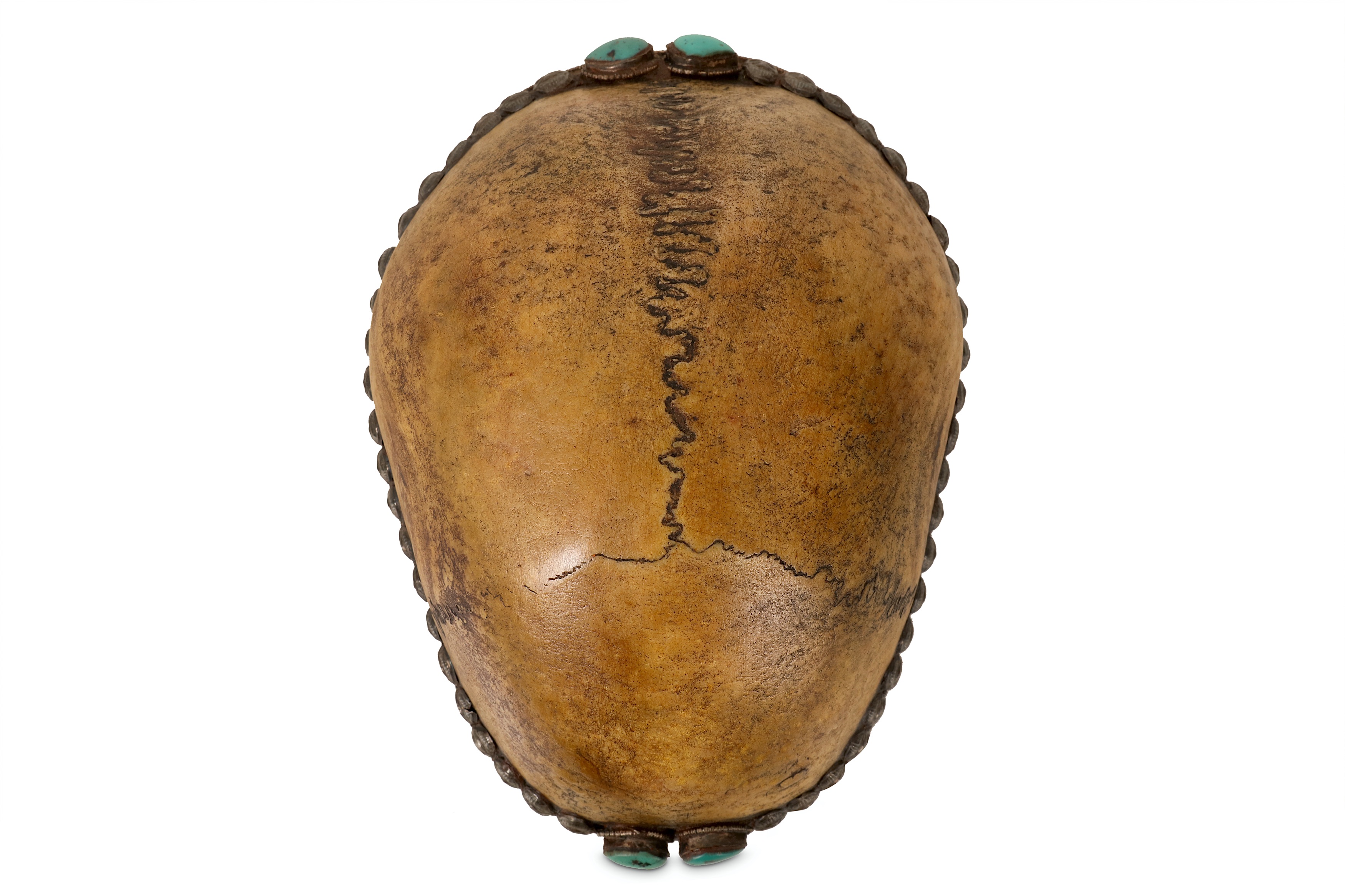 Lot 5 - A TIBETAN KAPALA SILVER LINED HUMAN SKULL CAP