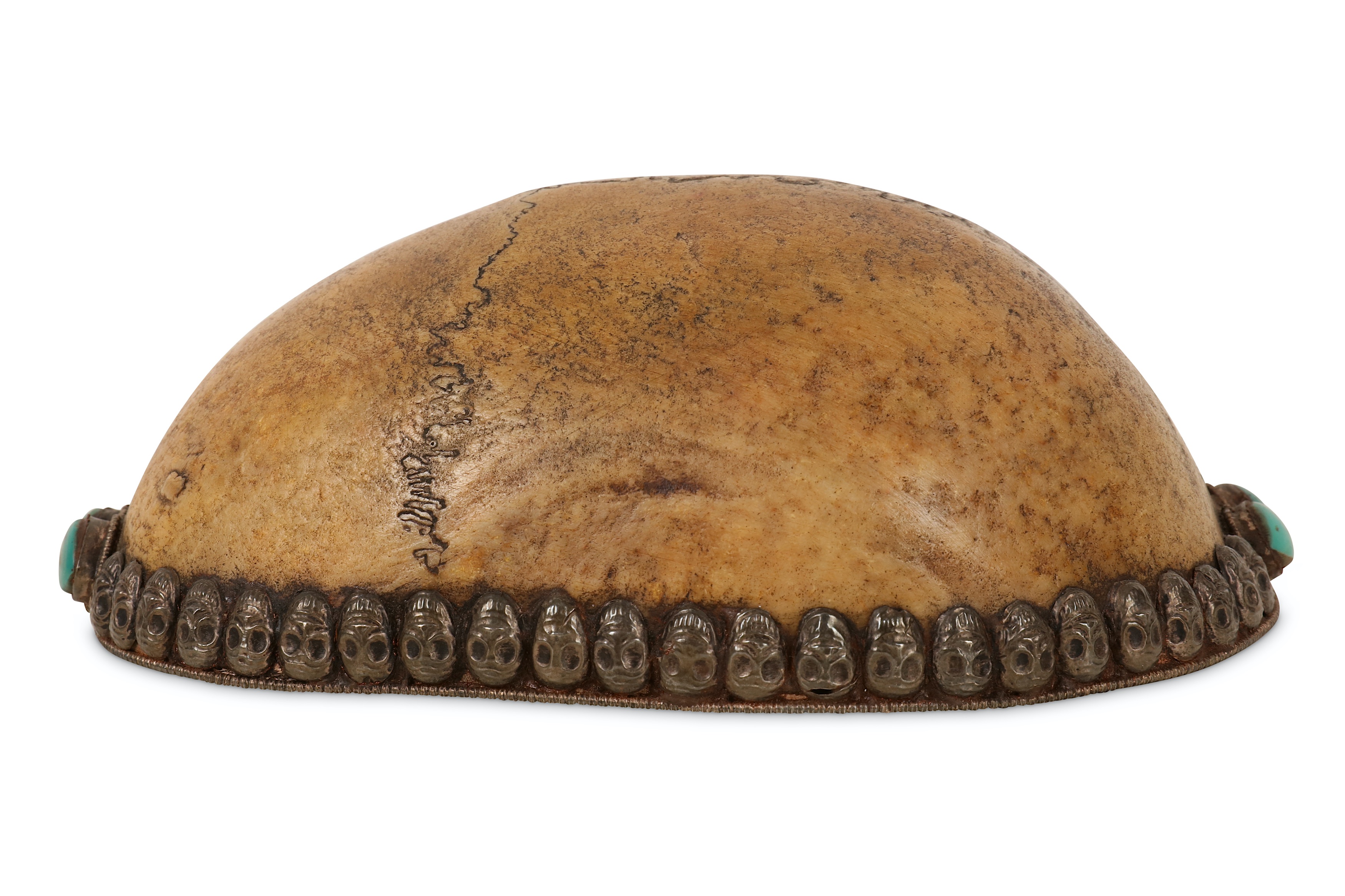 Lot 5 - A TIBETAN KAPALA SILVER LINED HUMAN SKULL CAP