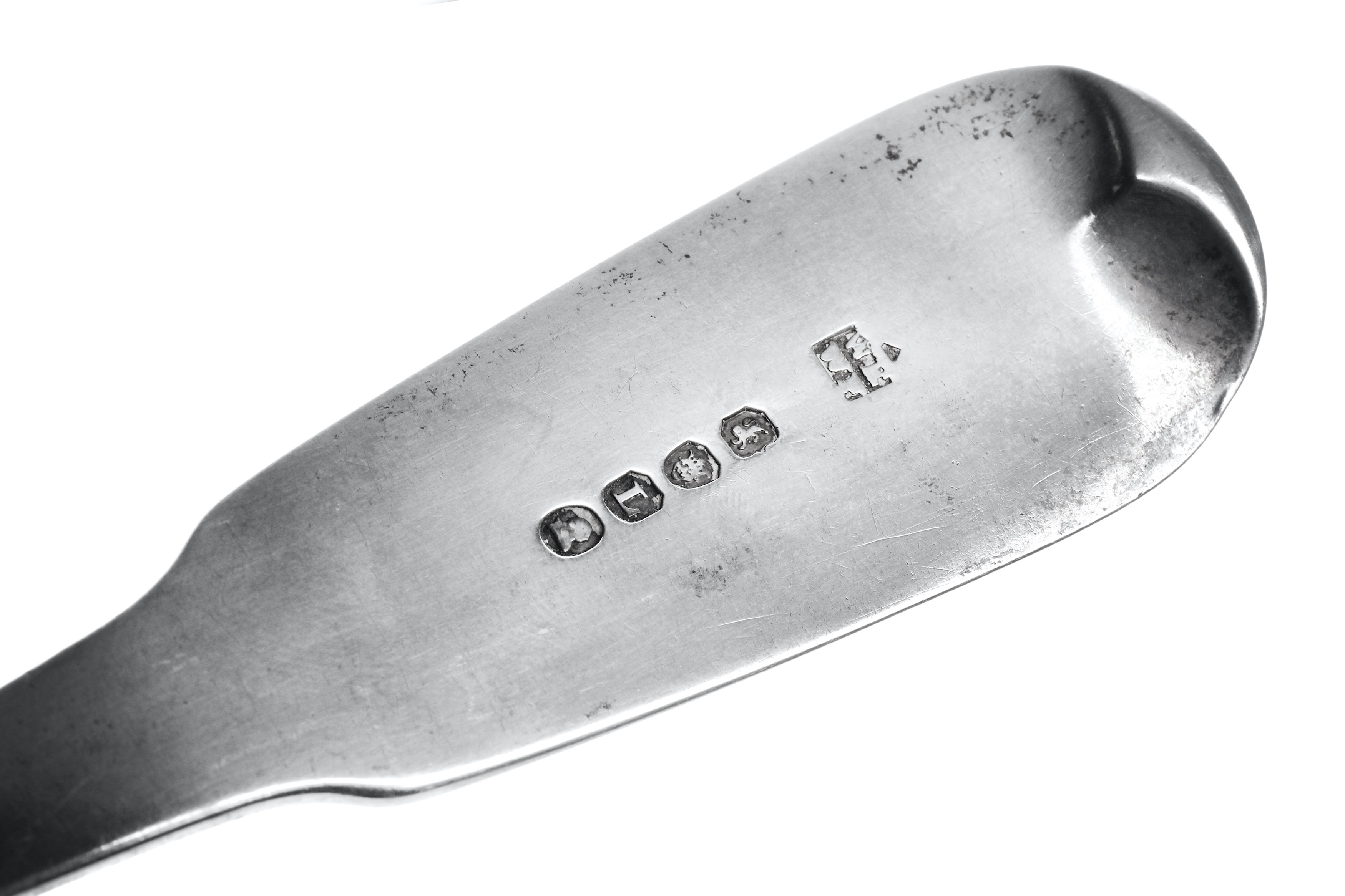 Lot 10 - A George III sterling silver fiddle back