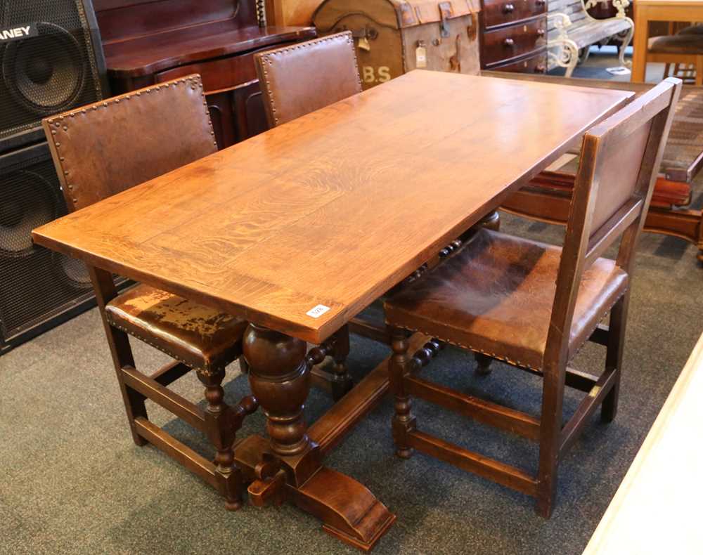 Lot 528 - A small oak refectory table, with four