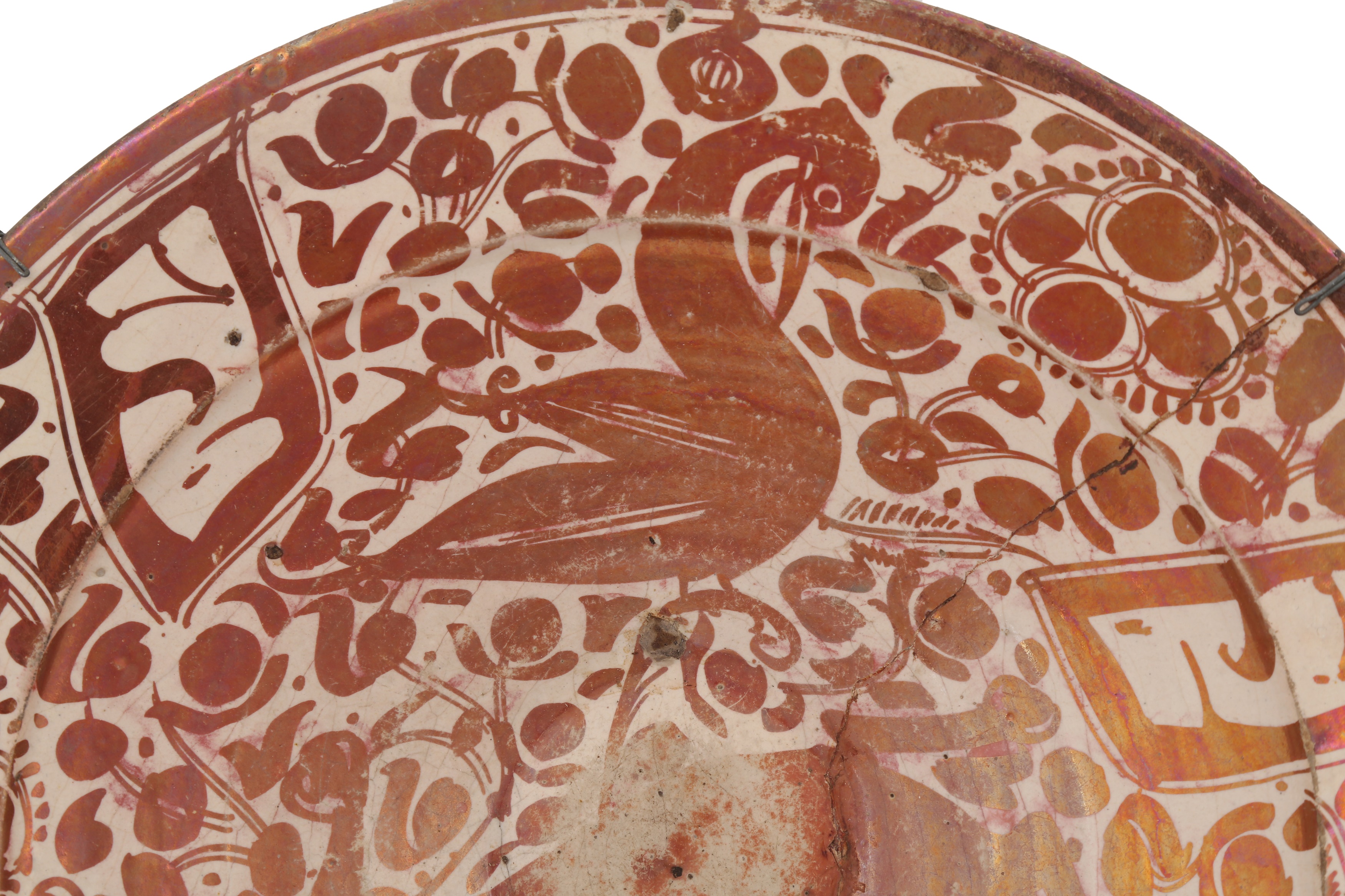 Lot 180 - AN HISPANO-MORESQUE COPPER-LUSTRE POTTERY