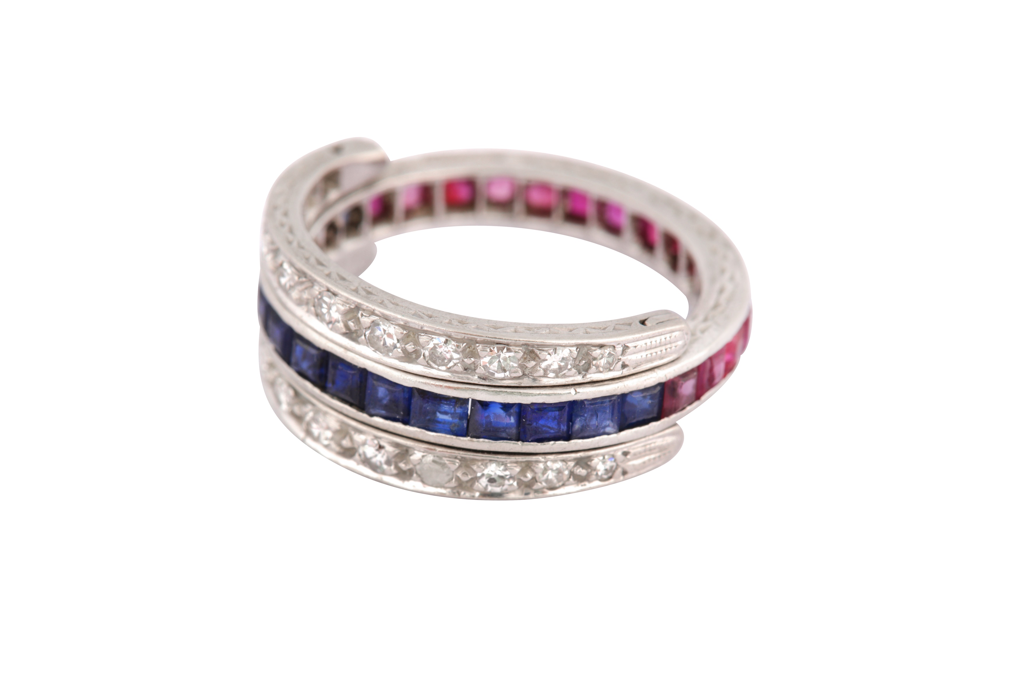 Lot 160 - A ruby, sapphire and diamond swivel ring,