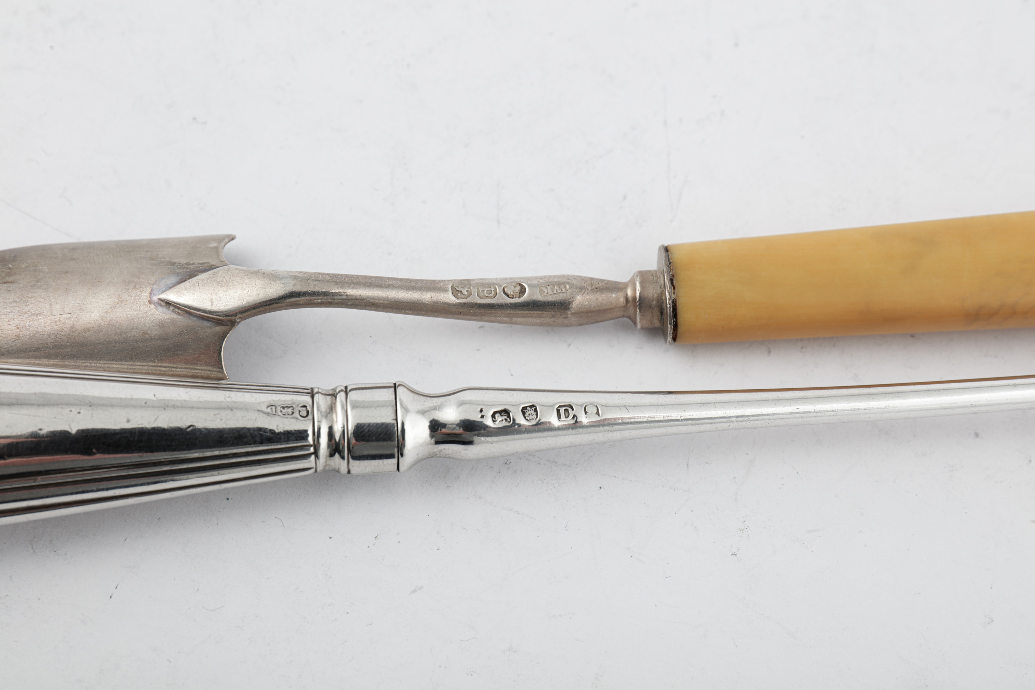 Lot 87 - A George III sterling silver stilton scoop,