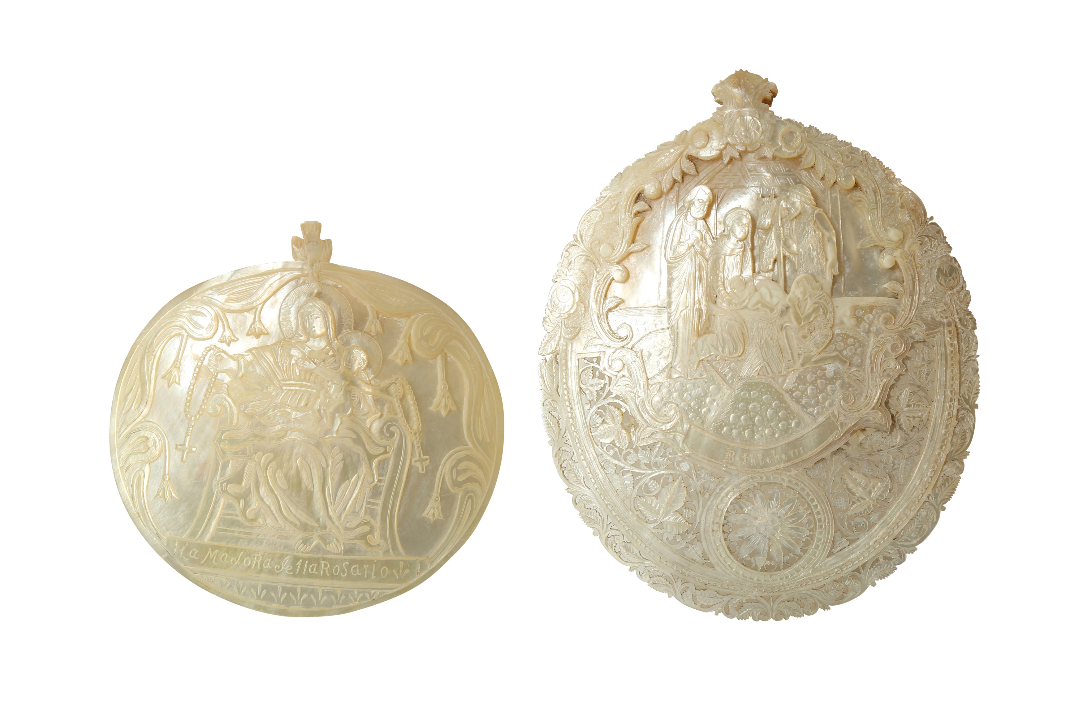 Lot 889 - λ TWO CARVED MOTHER-OF-PEARL SHELL PLAQUES