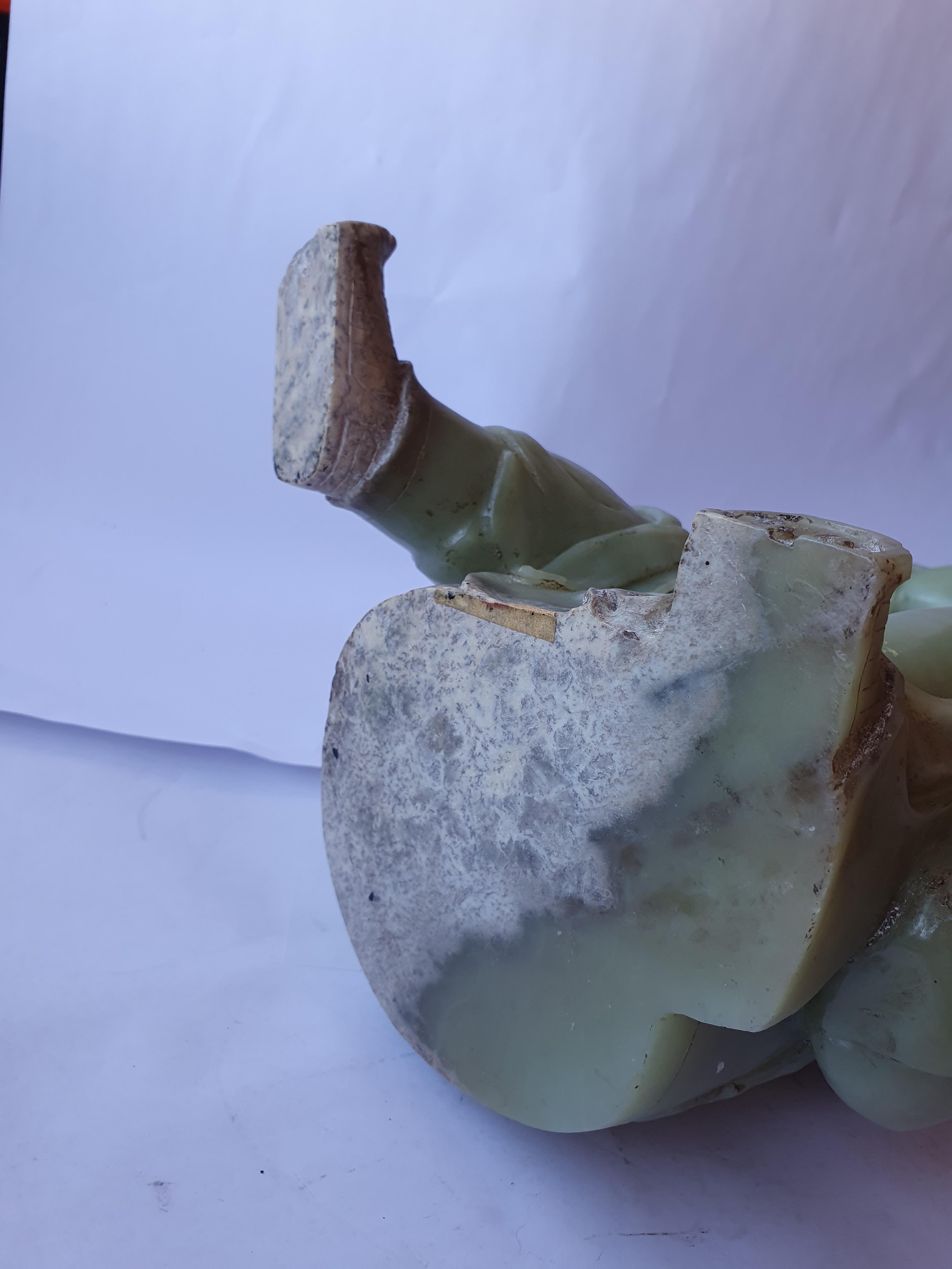Lot 530 - TWO CHINESE JADE CARVINGS AND A STONE