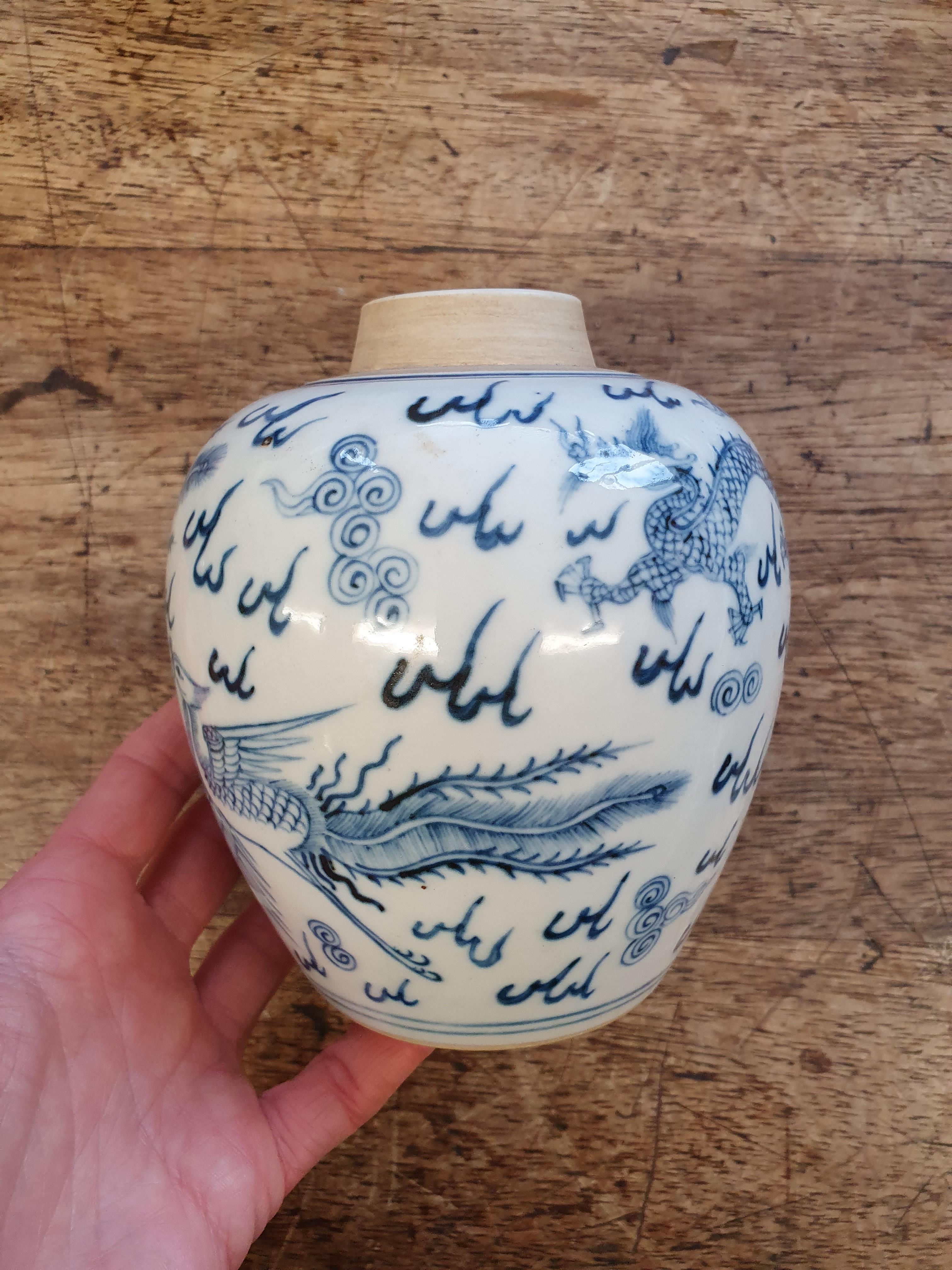 Lot 511 - TWO CHINESE 'MYTHICAL BEASTS' JARS.