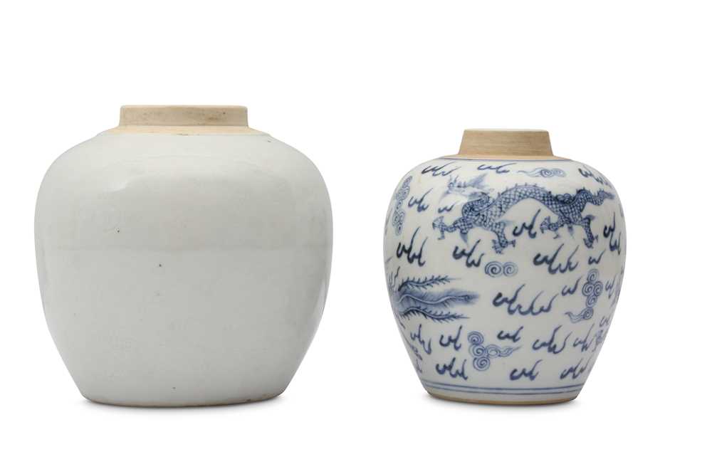 Lot 511 - TWO CHINESE 'MYTHICAL BEASTS' JARS.