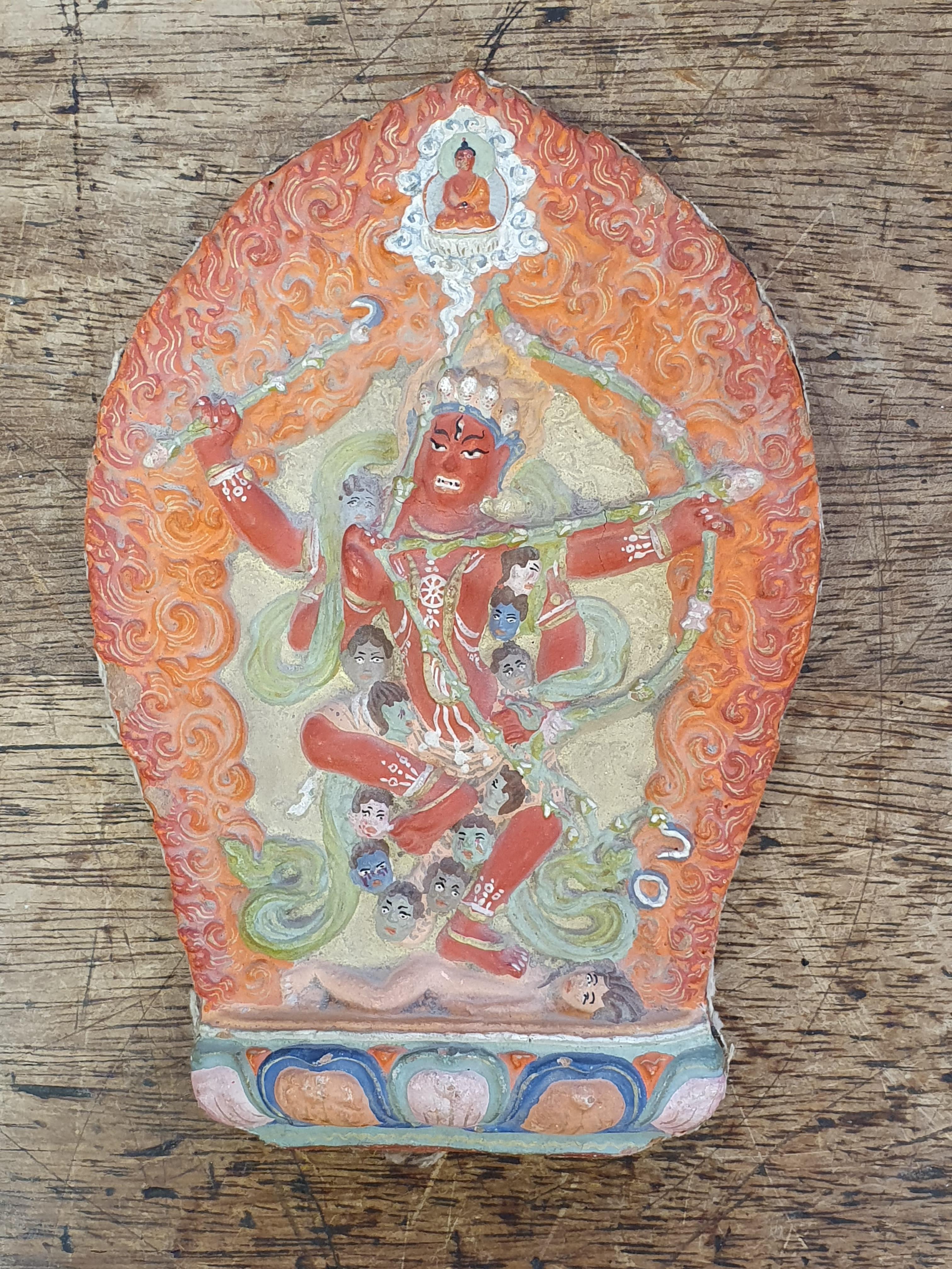 Lot 747 - A TIBETAN CLAY TSATSA OF KURUKULLA.