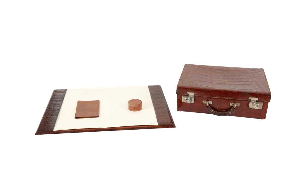 Lot 759 A CROCODILE SUITCASE 20TH CENTURY lot-759-a-crocodile-suitcase-20th-century