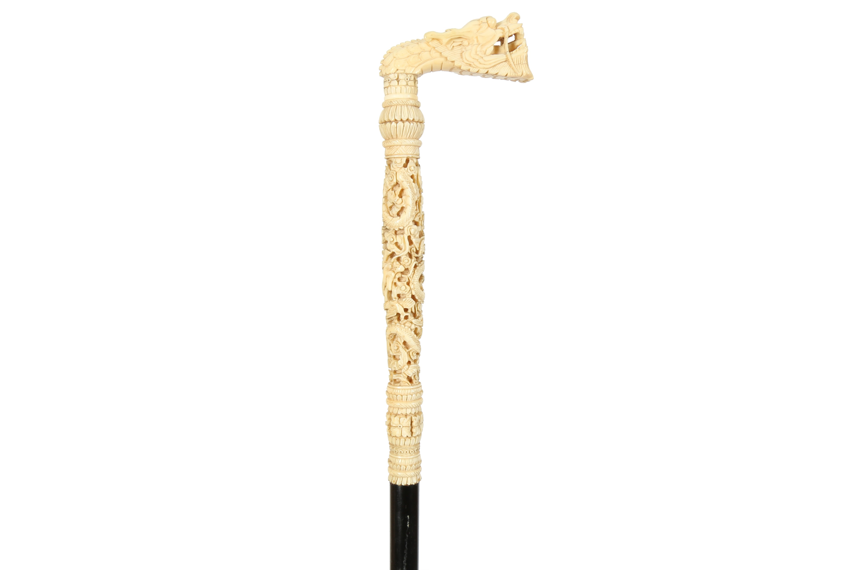 Lot 255 - A CANTONESE CARVED IVORY HANDLED WALKING