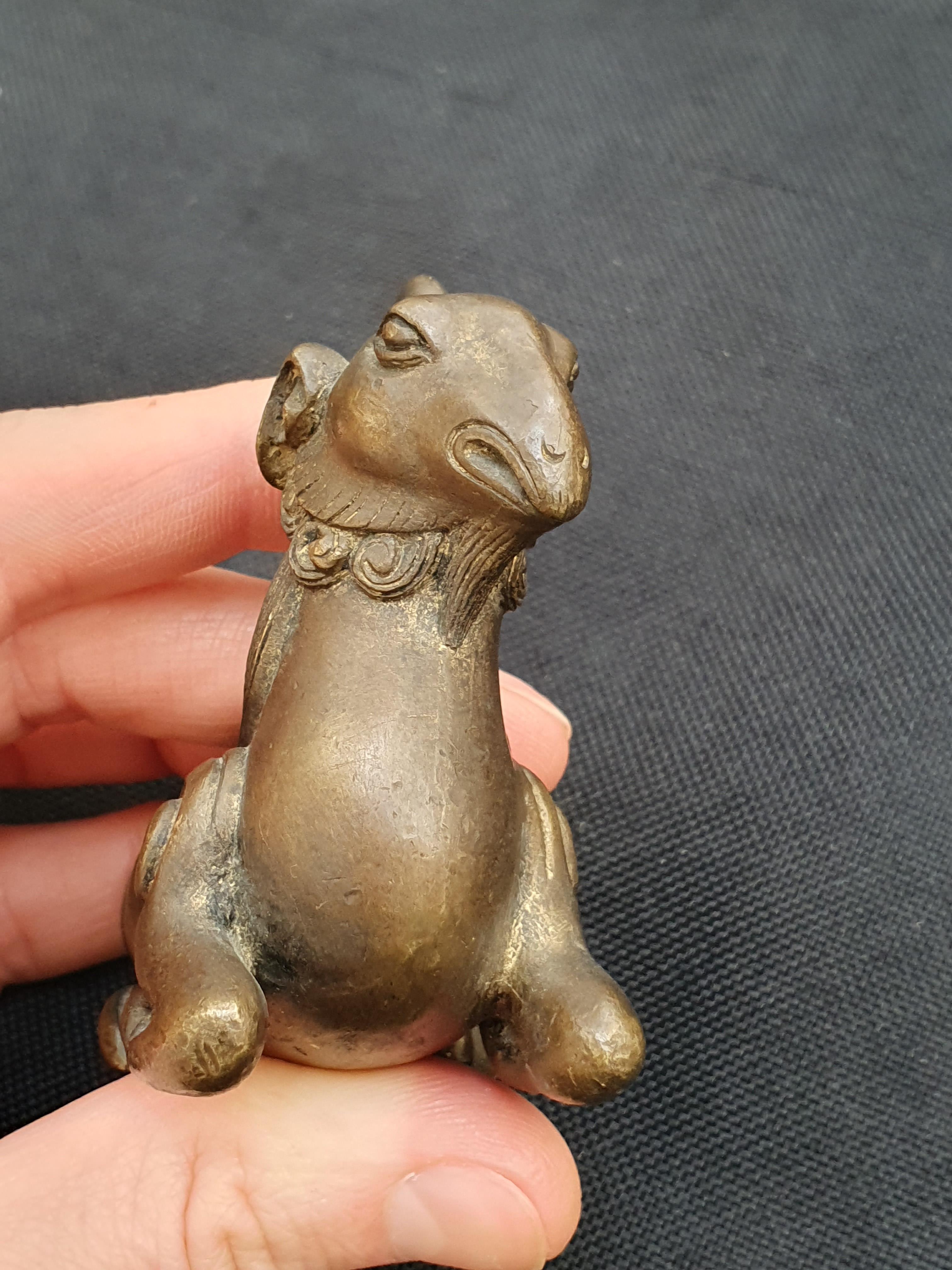 Lot 166 - A CHINESE BRONZE 'MYTHICAL BEAST'