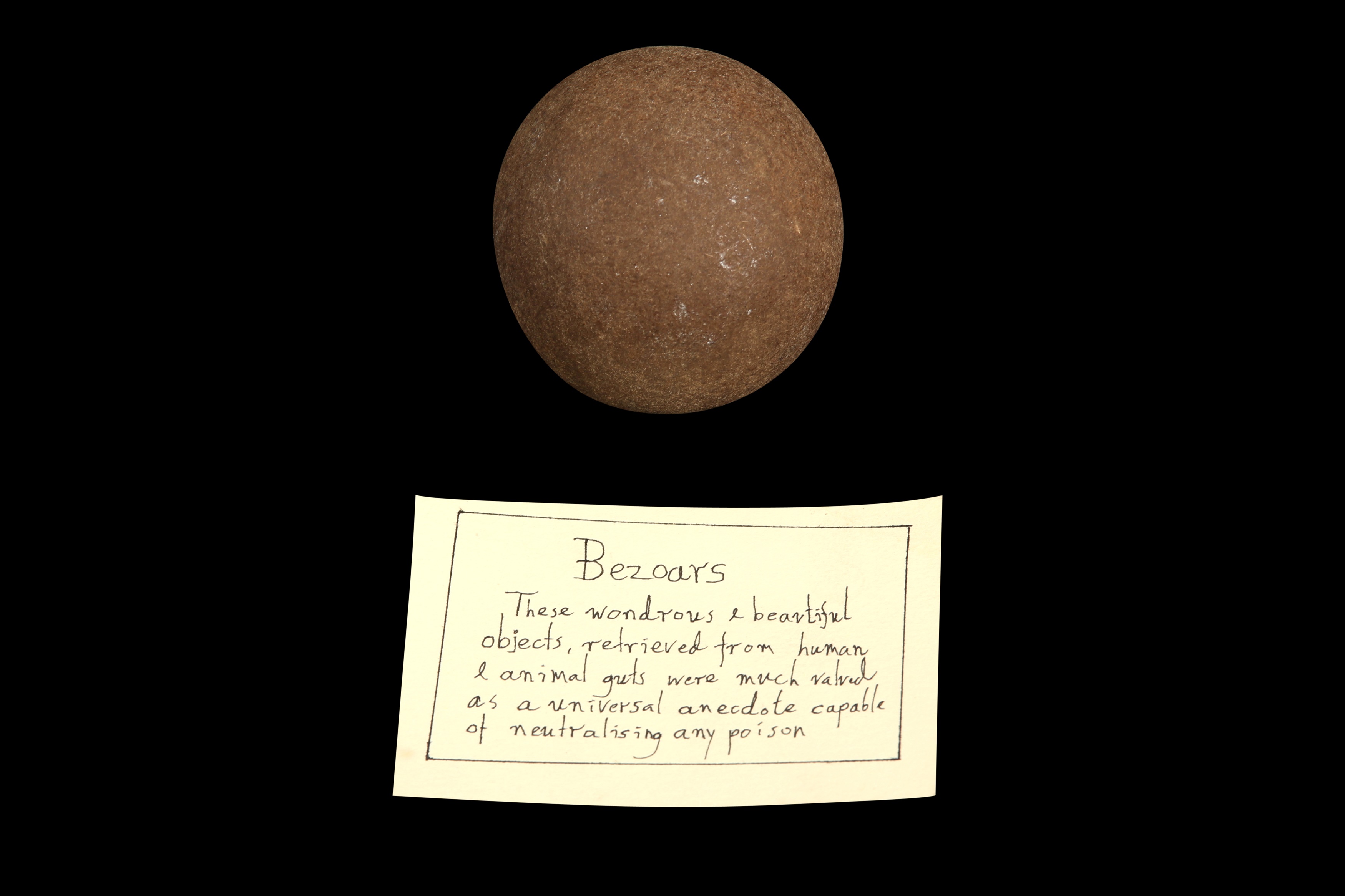 Lot 48 - NATURAL HISTORY: A RARE BEZOAR (HAIR BALL)