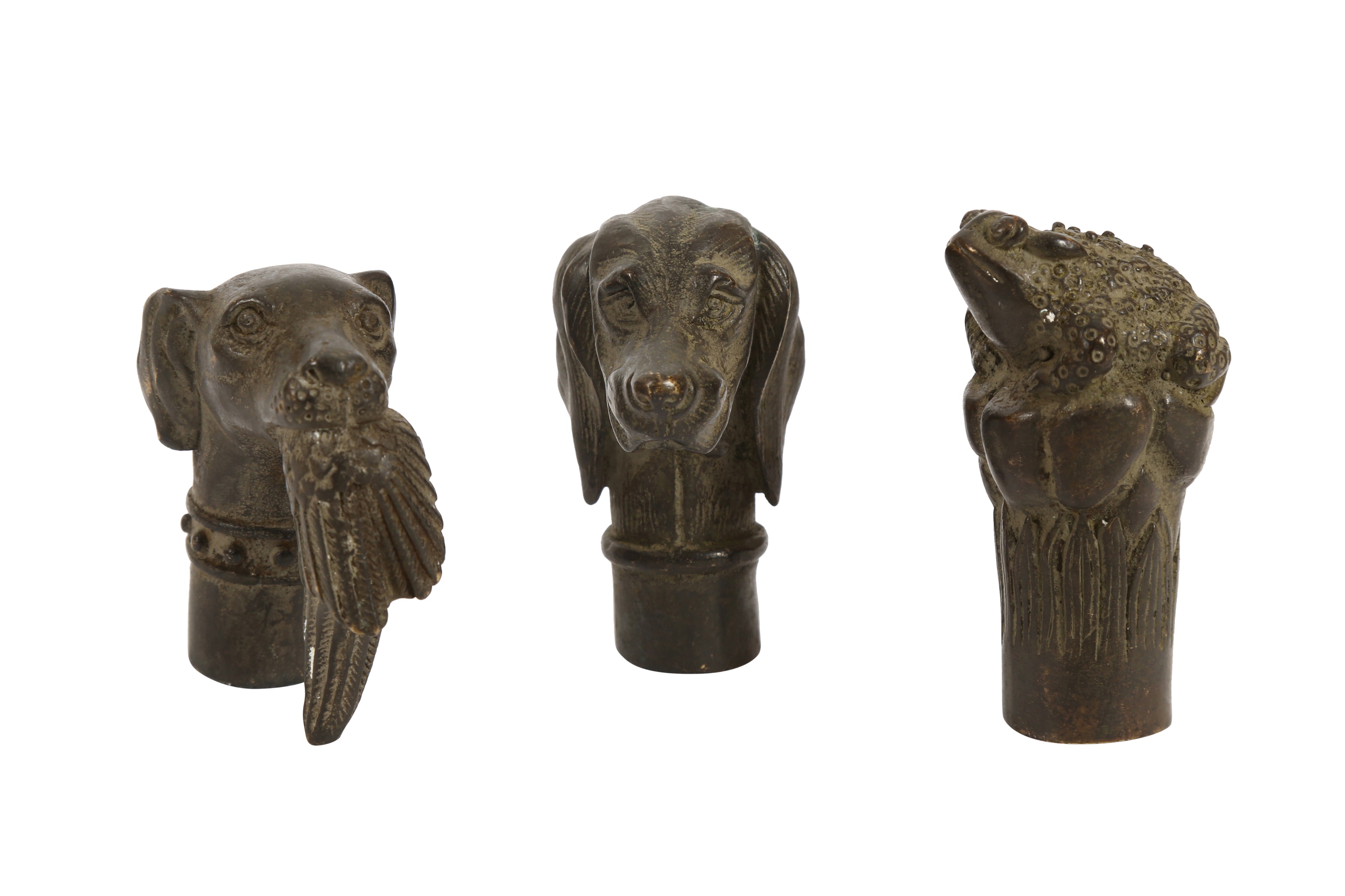 Lot 344 - A MOULDED METAL CANE TOP IN THE FORM OF A