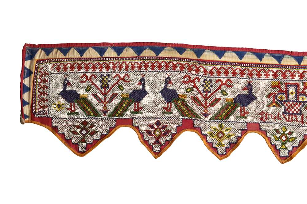 Lot 409 - A CEREMONIAL INDIAN BEADWORK BORDER HANGING