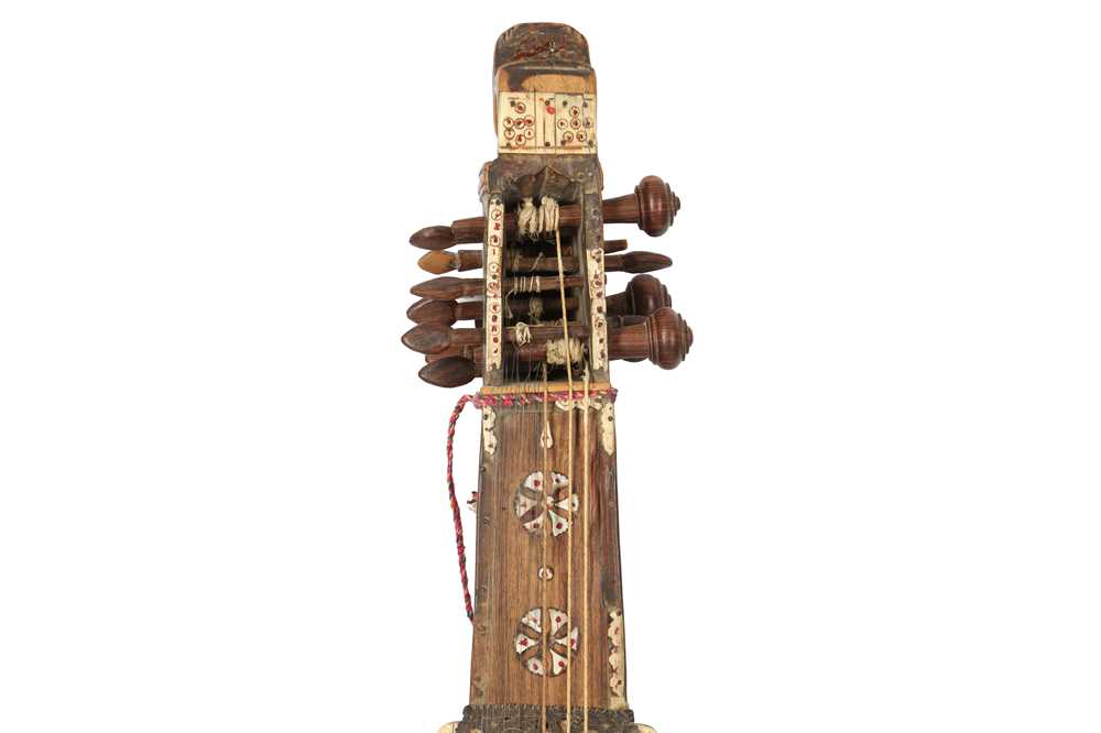 Lot 748 - AN ENSEMBLE OF SOUTH ASIAN INSTRUMENTS FROM