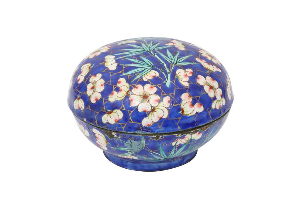 Lot 714 - A CHINESE BLUE-GROUND CANTON ENAMEL 'PRUNUS