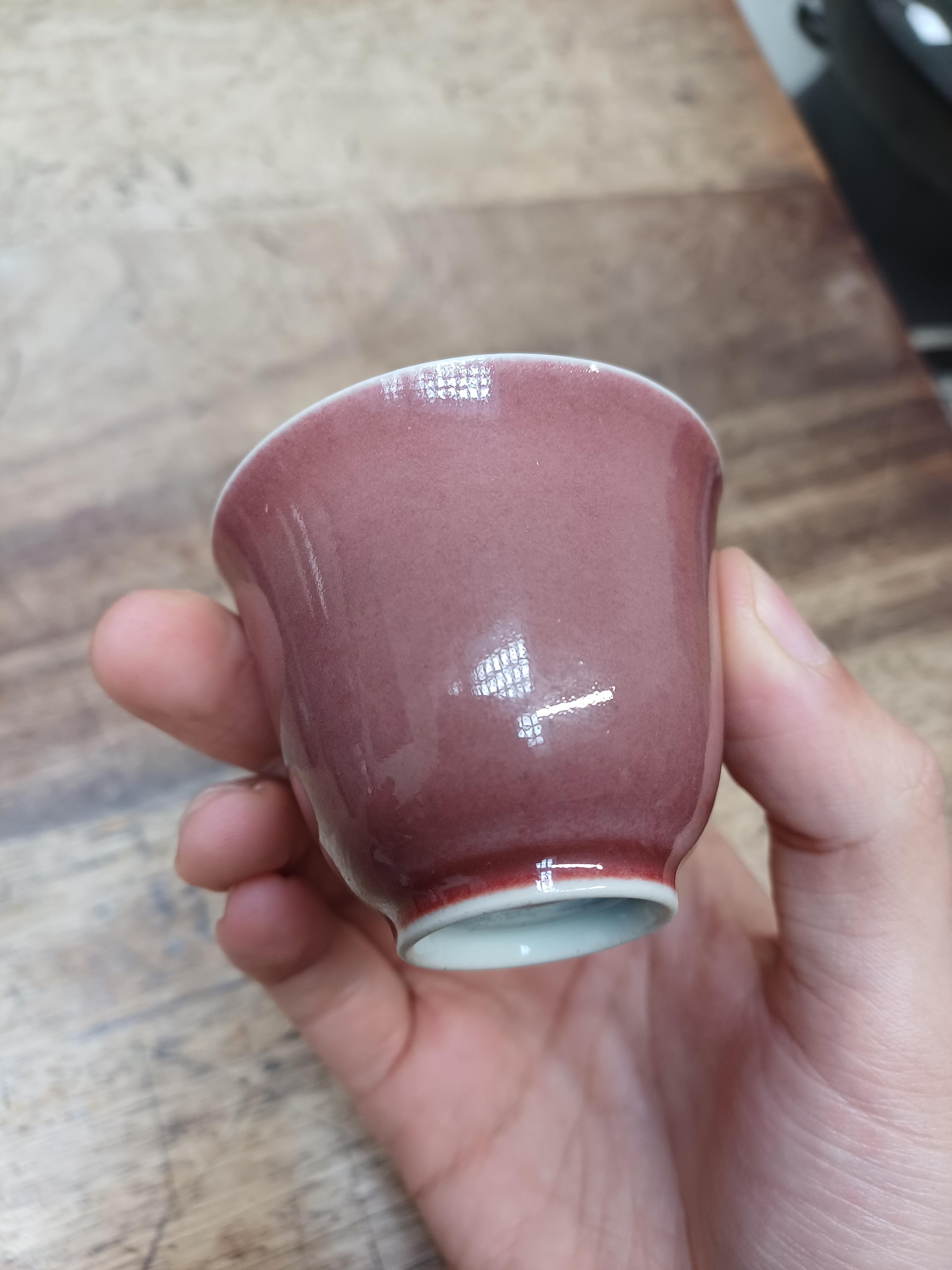 Lot 155 - A CHINESE COPPER RED-GLAZED CUP