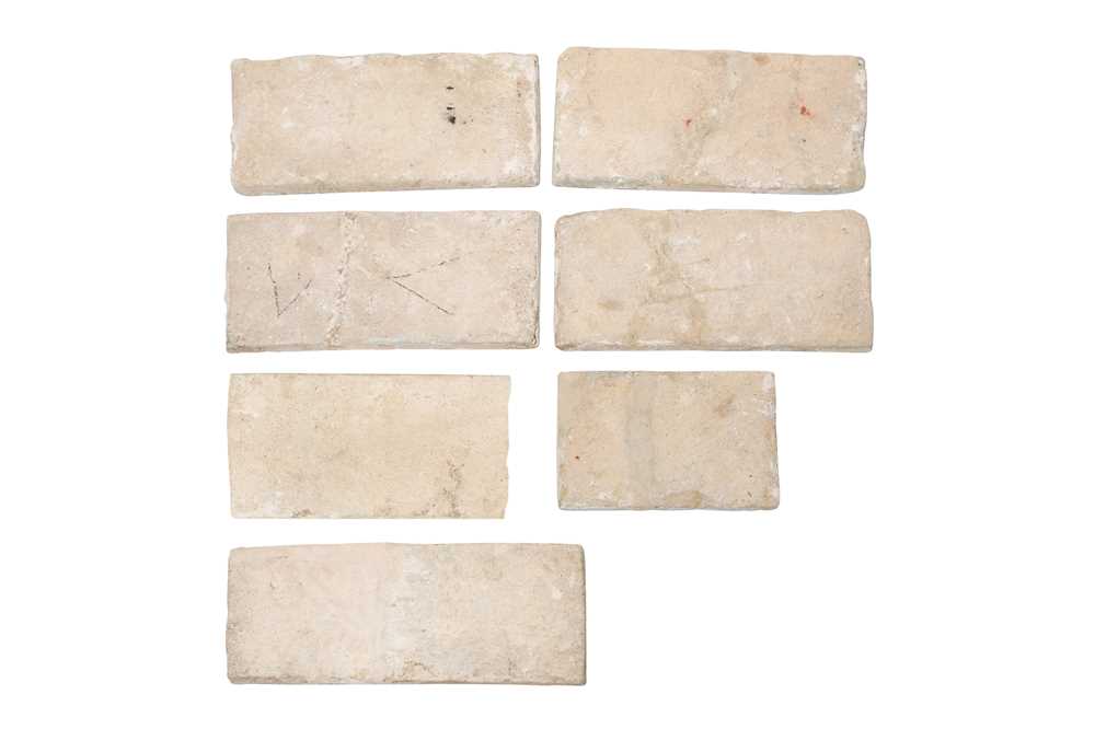 Lot 332 - SEVEN IZNIK POTTERY BORDER TILES WITH LOTUS