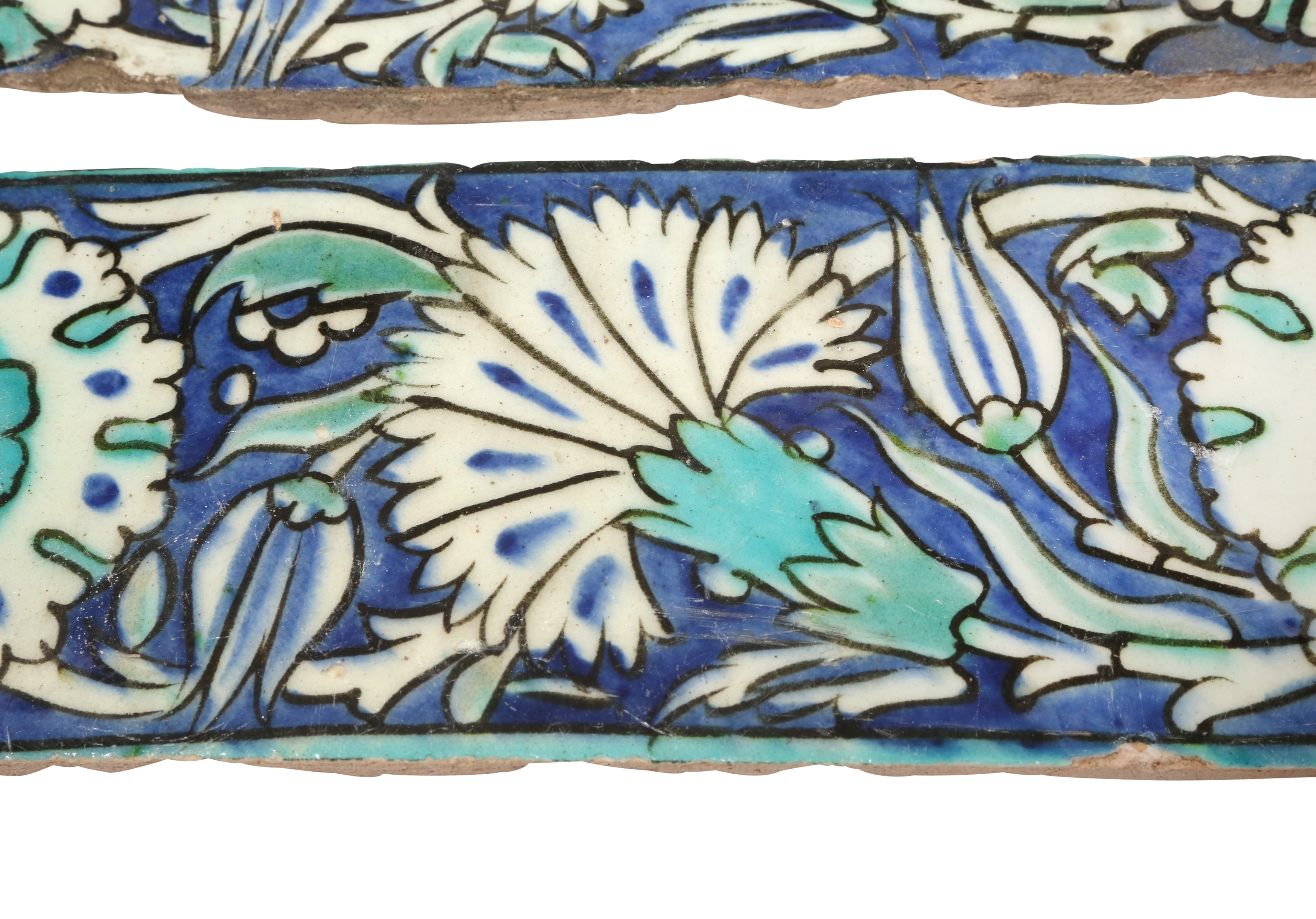 Lot 331 - FOUR POTTERY BORDER TILES WITH CARNATIONS