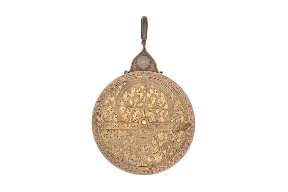 Lot 92 - AN ENGRAVED BRASS ASTROLABE