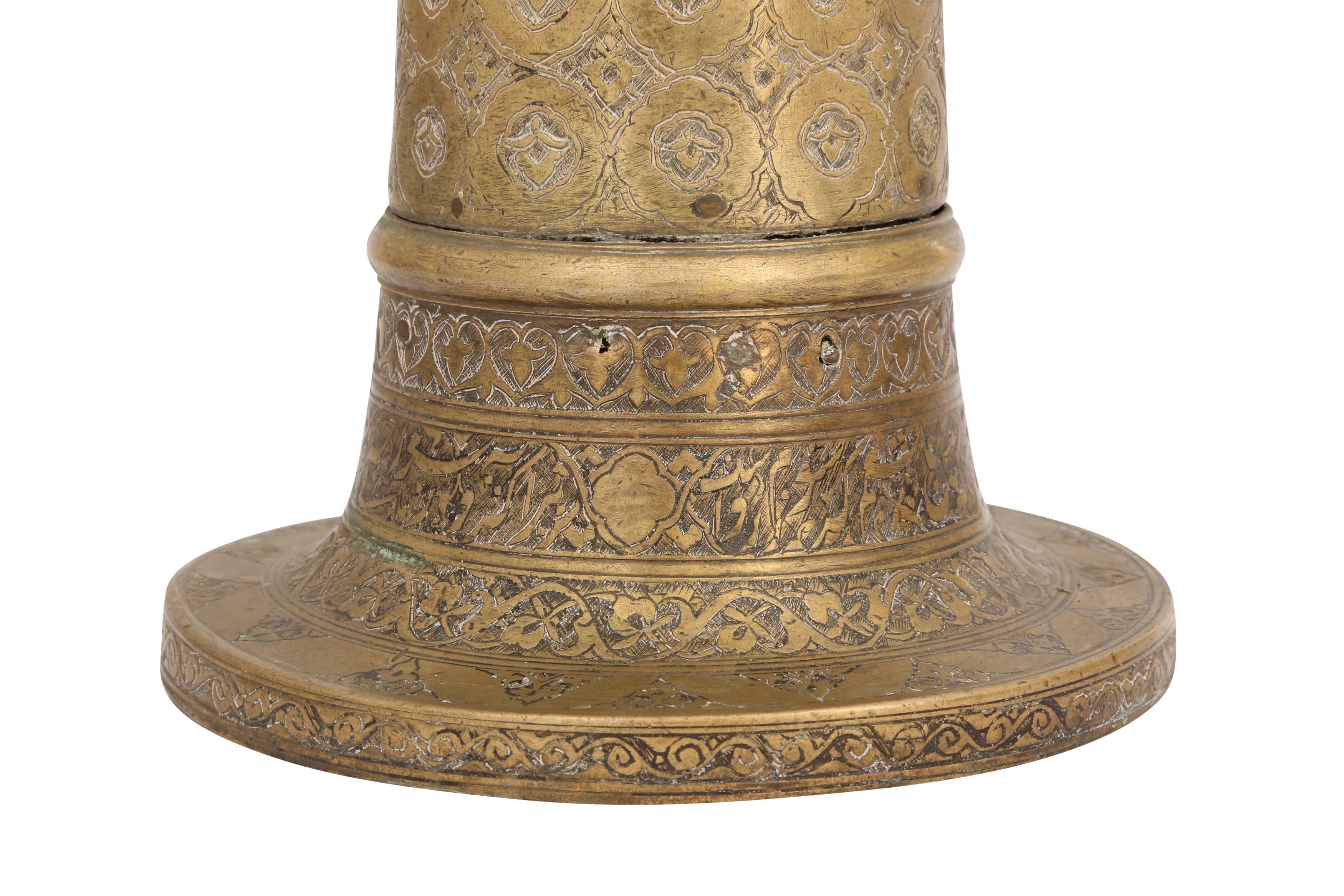 Lot 369 - A SAFAVID ENGRAVED BRASS TORCH STAND
