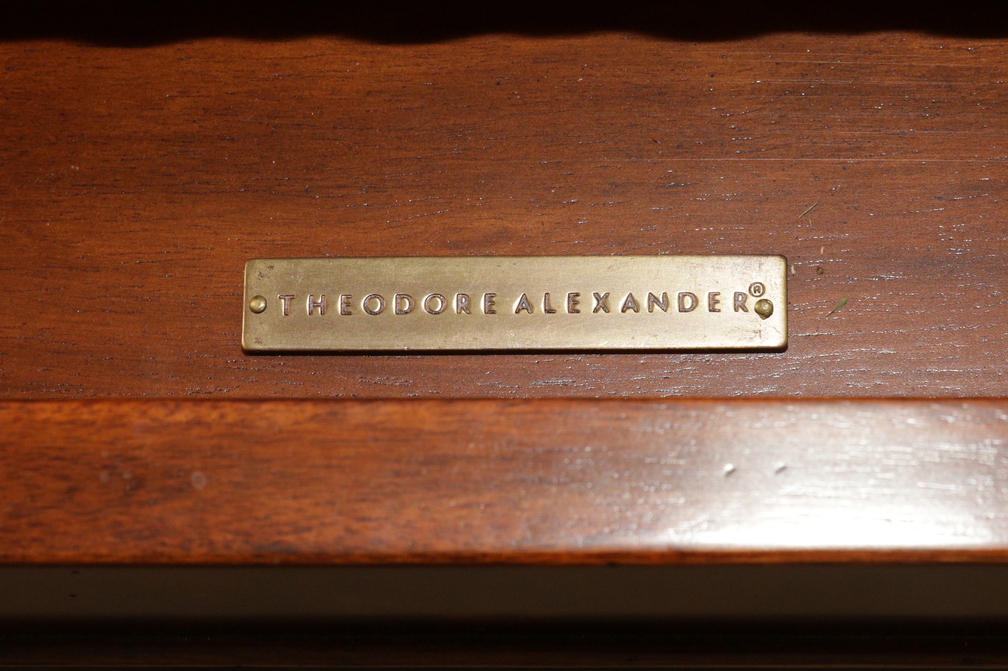 Lot 110 - A THEODORE ALEXANDER FIGURED MAHOGANY