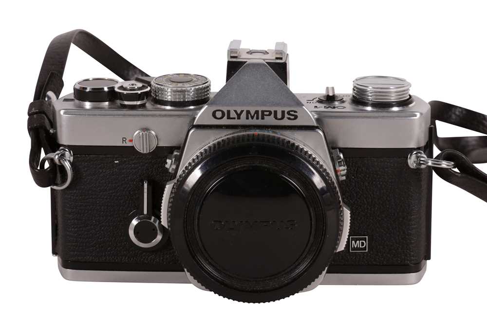 Lot 536 - A Olympus OM1 SLR Camera Outfit